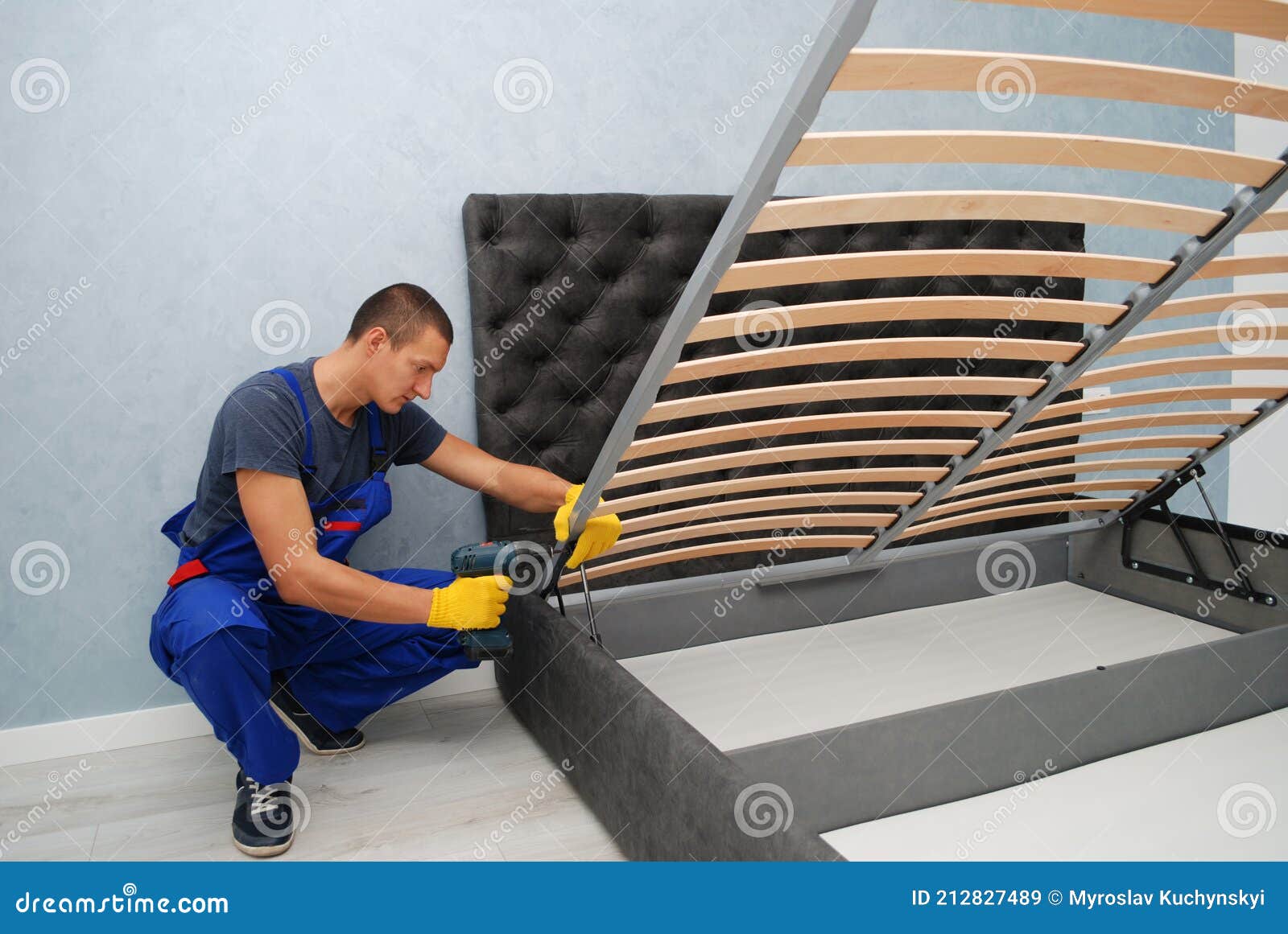 Assembling a new bed stock image. Image of service, electric - 212827489