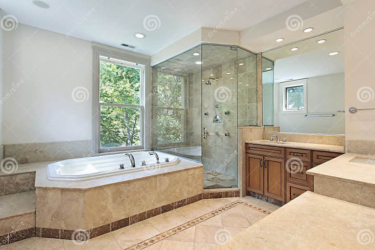 Master Bath with Step Up Tub Stock Photo - Image of lighting, design ...