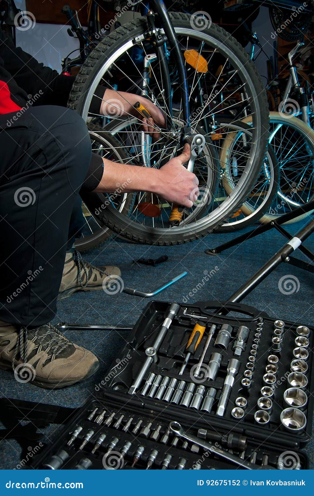 Master Bike Repairs in the Workshop Stock Photo - Image of mechanic, bike: 92675152