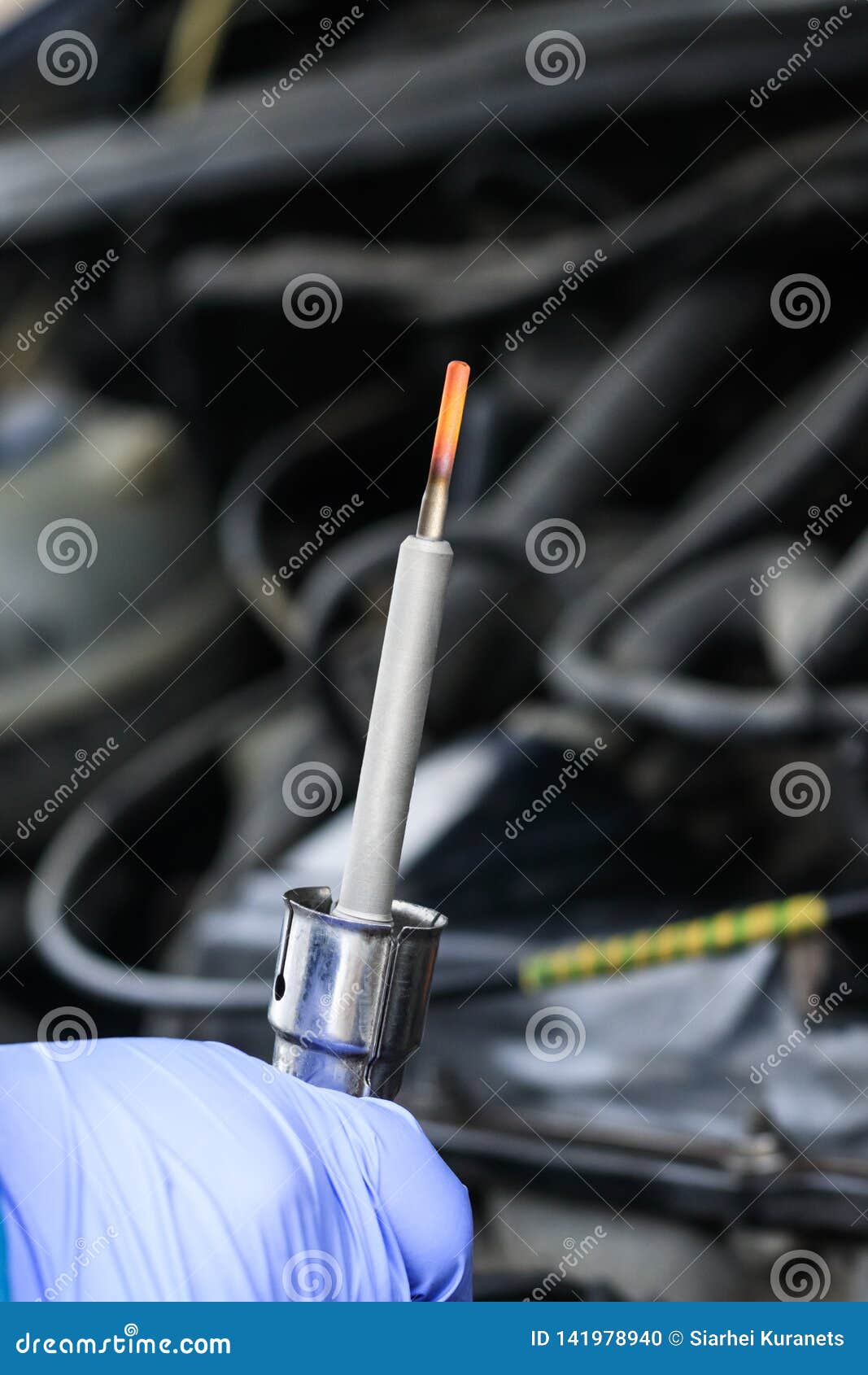 Master in Blue Gloves Check the Candle. Engine Compartment in the Car ...