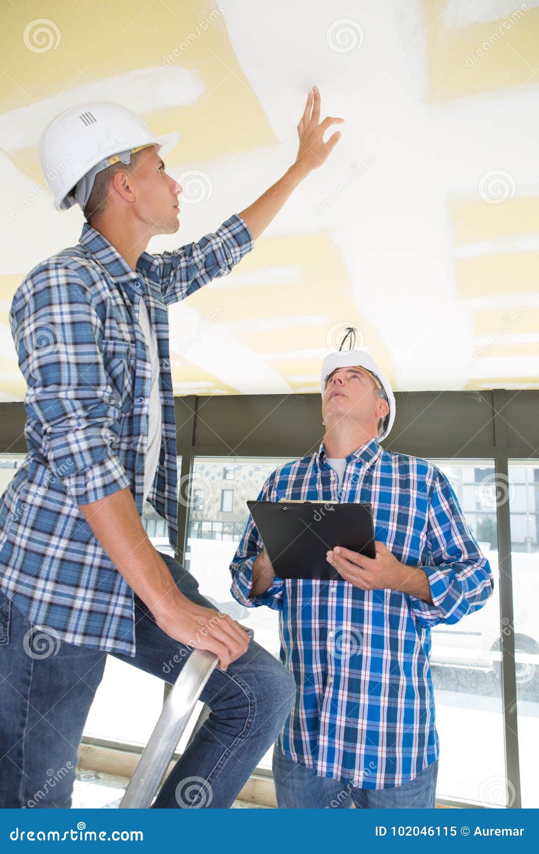 Master Builders Renovating Ceiling Stock Image - Image of manual ...