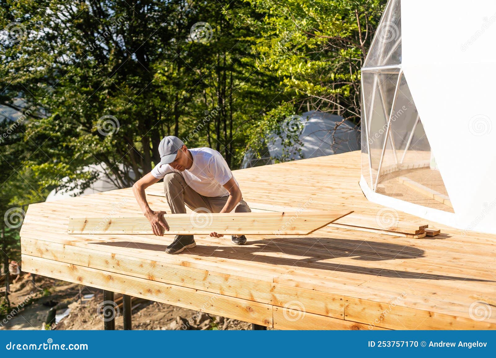 The Master Builds the Dome. Outside Spherical Glamping Dome ...