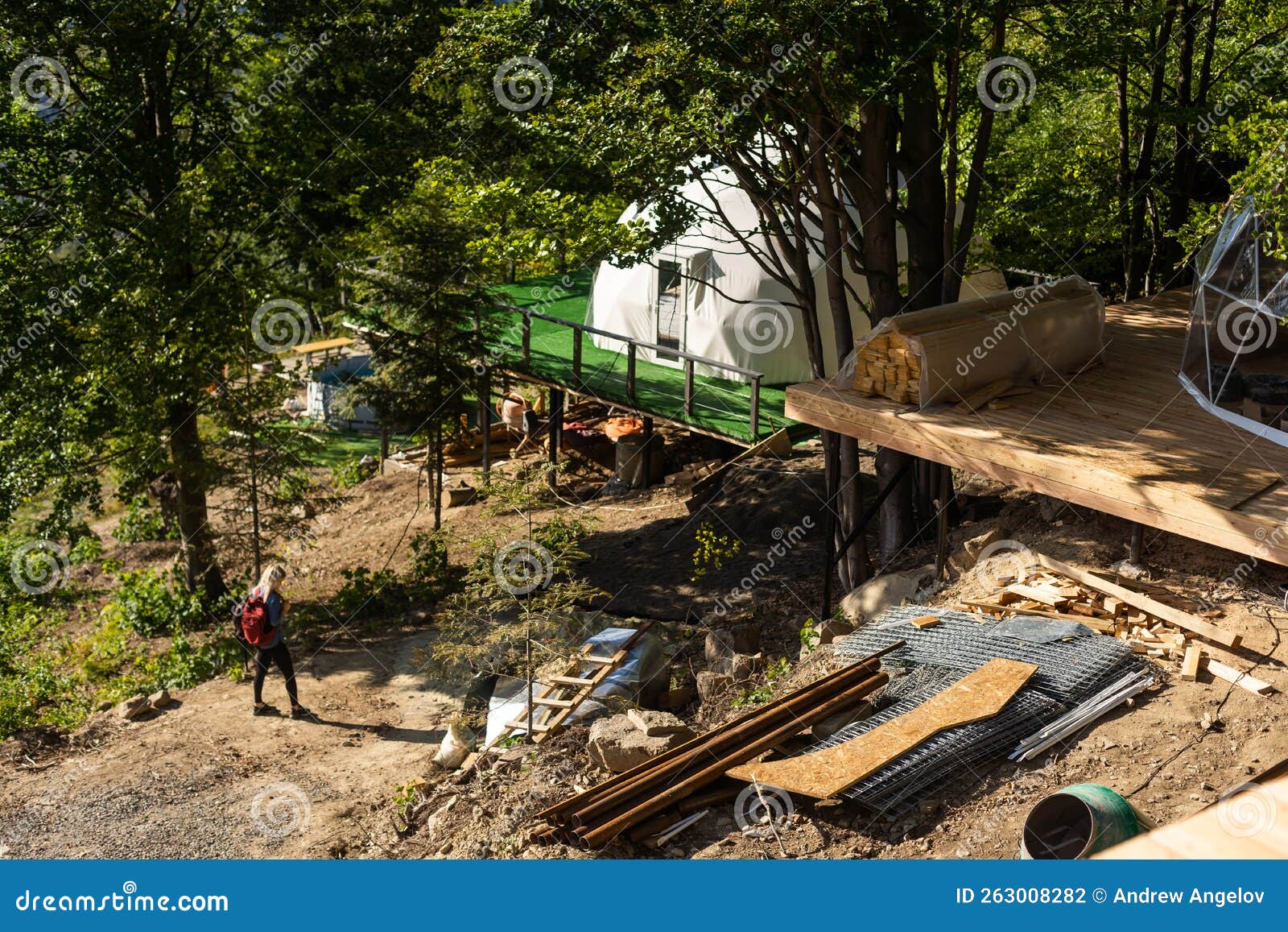 The Master Builds The Dome. Outside Spherical Glamping Dome ...