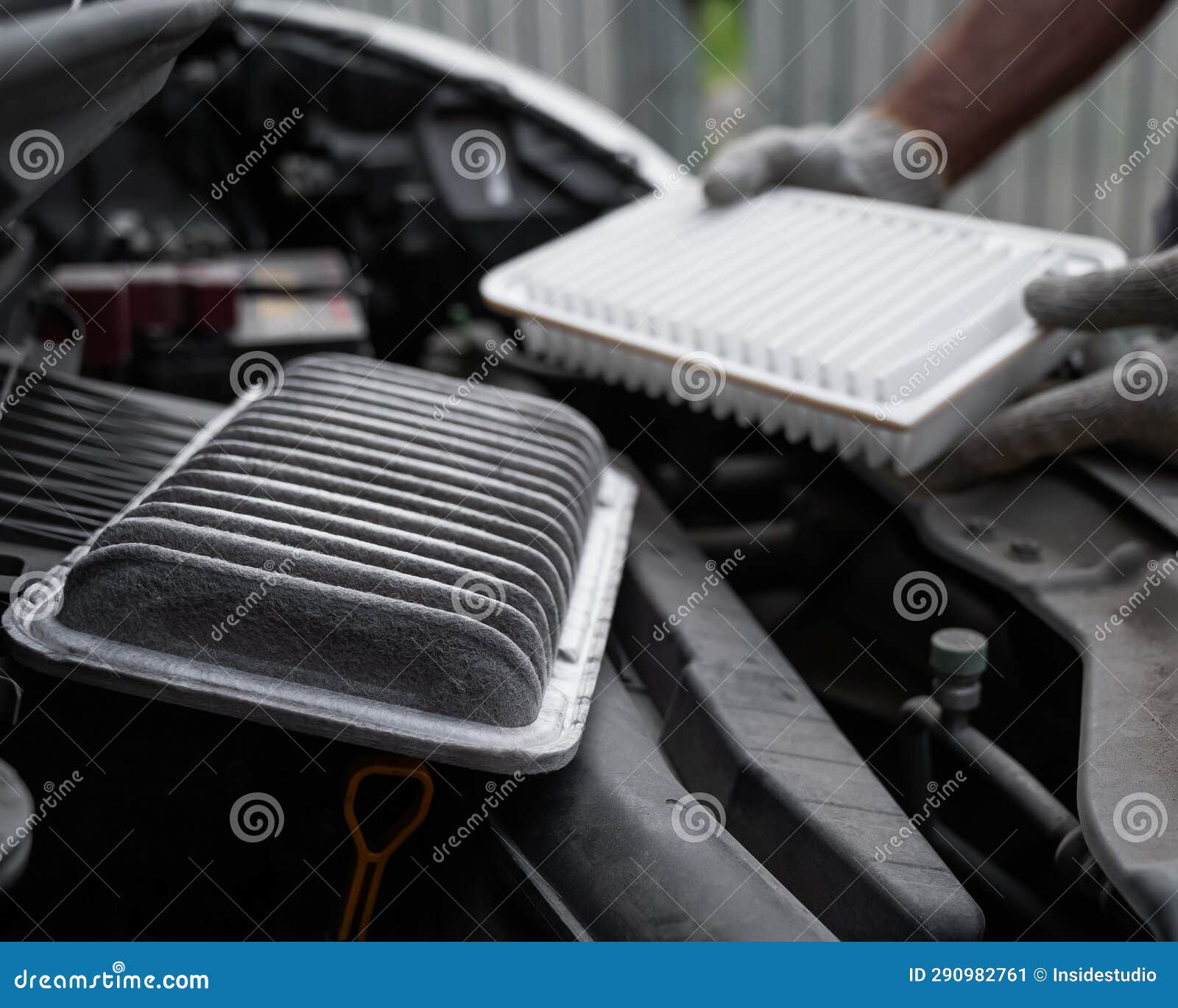 The Master Changes the Air Filter in the Car Engine. Stock Image ...