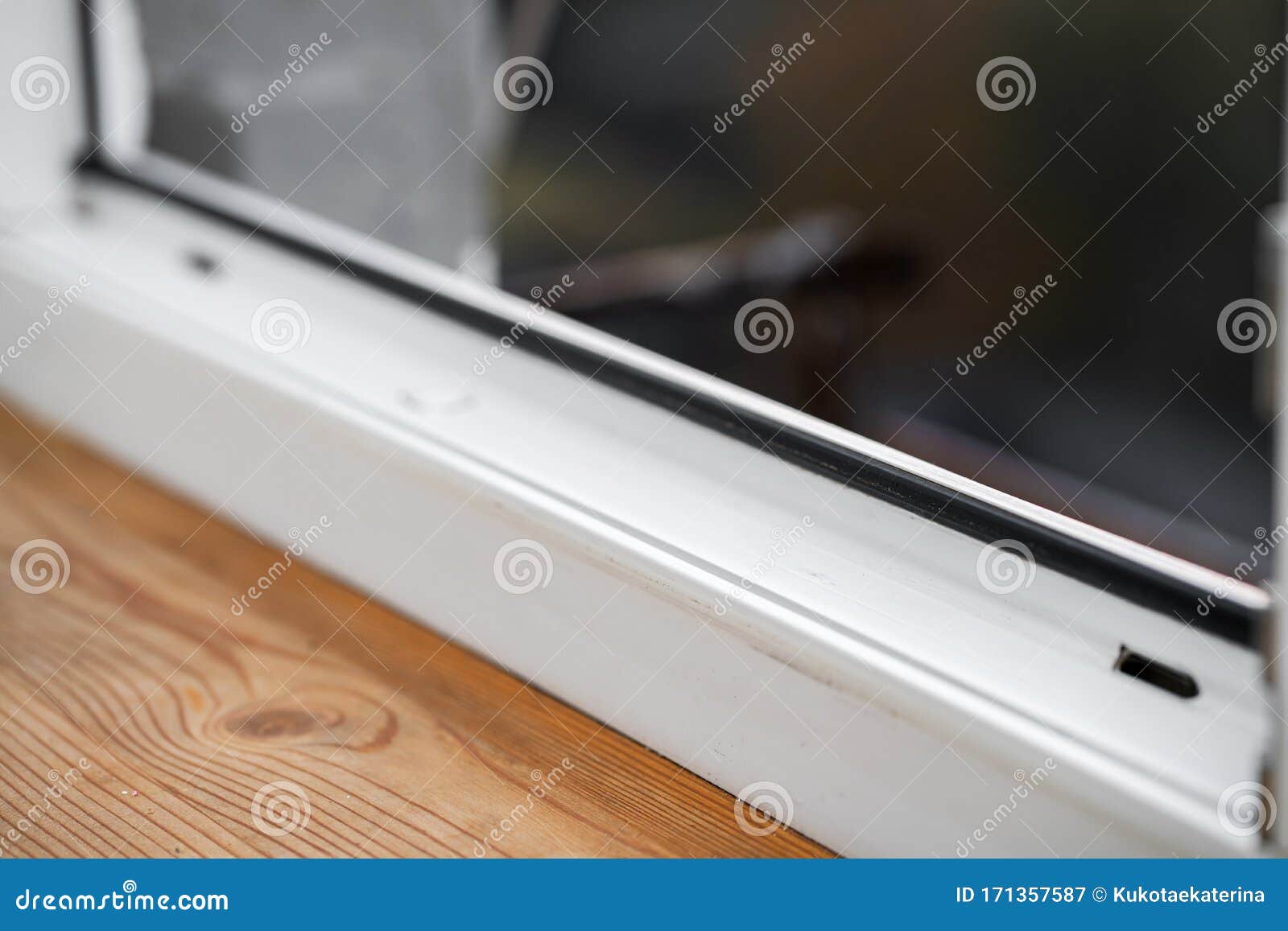 The Master Changes Rubber Seal Gasket in Pvc Windows Stock Image ...