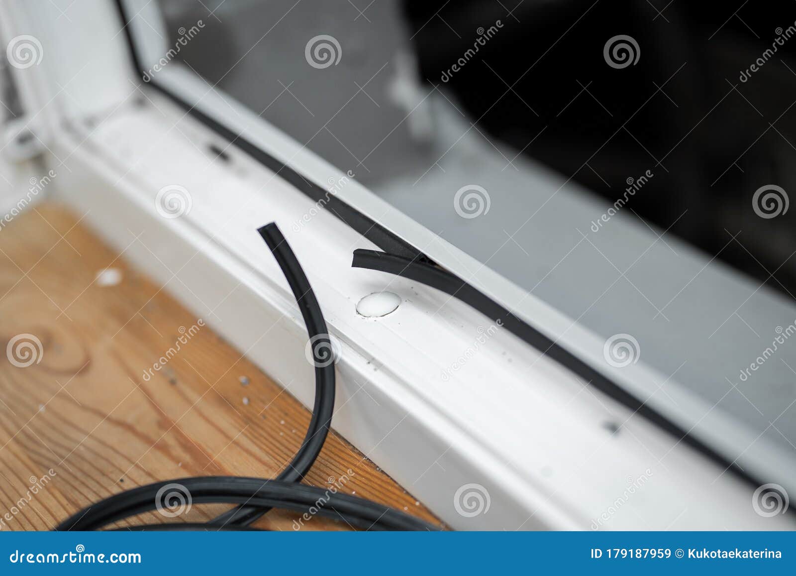 The Master Changes Rubber Seal Gasket in Pvc Windows Stock Image ...