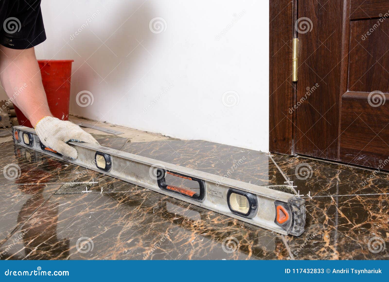 The Master Checks the Tile Surface`s Tile Level Stock Image - Image of ...