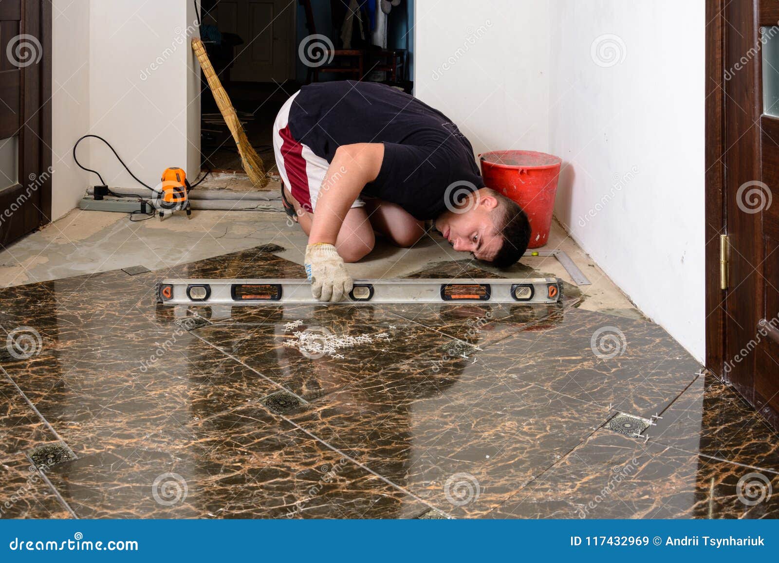 The Master Checks the Tile Surface`s Tile Level Stock Image - Image of ...