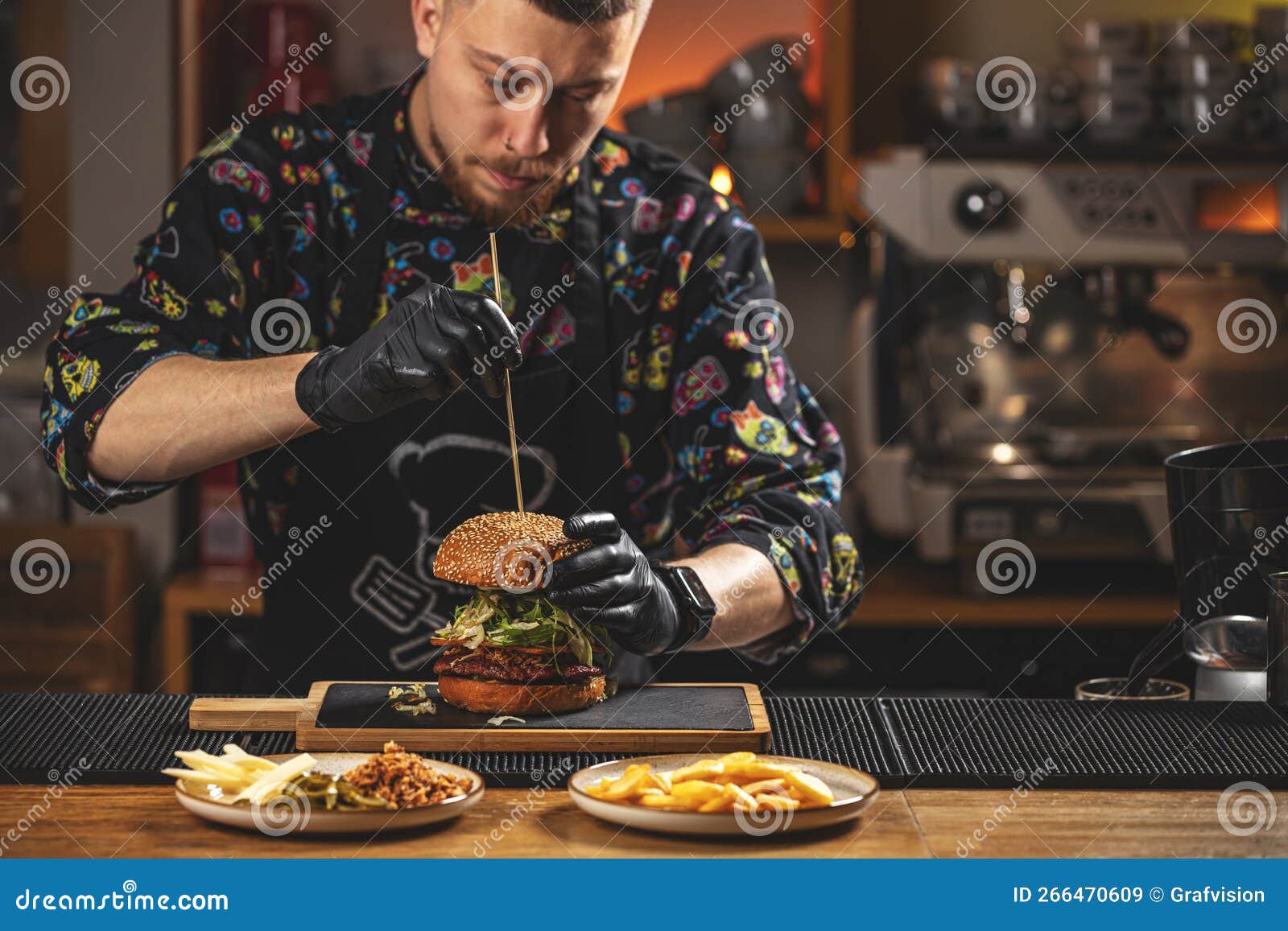 Master Chef Putting Toothpick on a Burger Stock Image - Image of ...