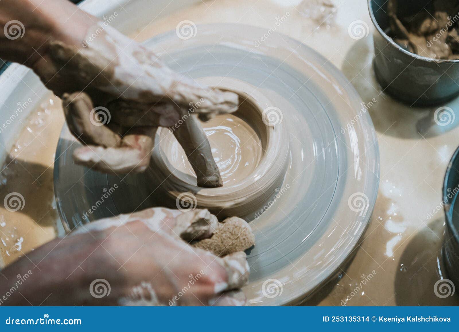 Work in a Pottery Workshop. Close-up of Hands and Potter`s Wheel Stock ...