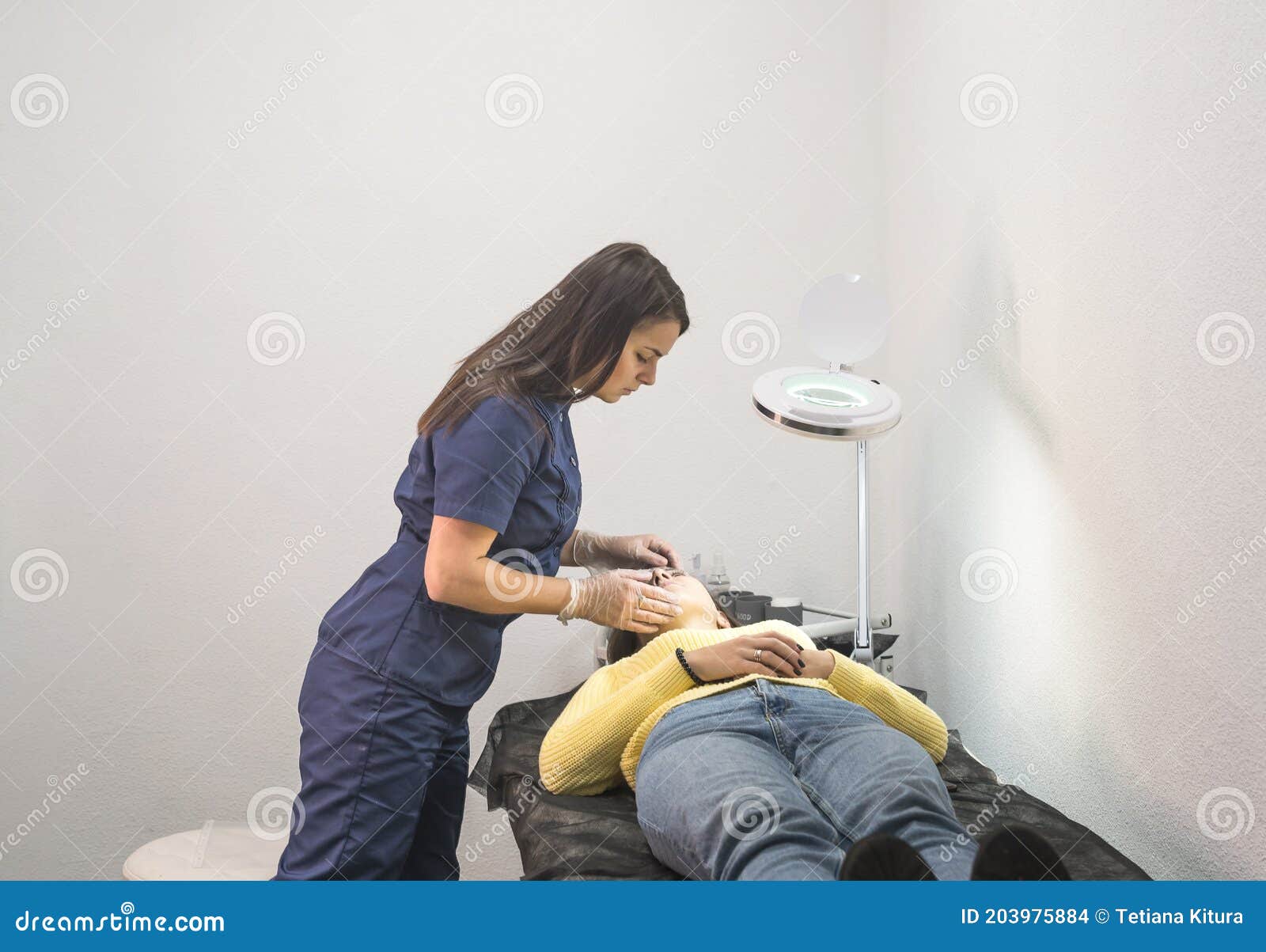 Master and Client in the Salon during the Procedure Stock Photo - Image ...
