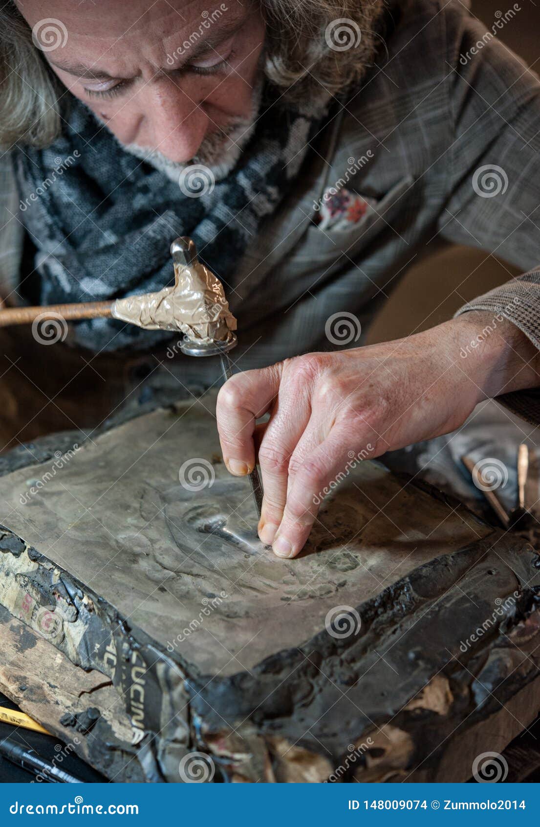 Silversmith at Work on a Silver Plate Stock Photo - Image of contour ...