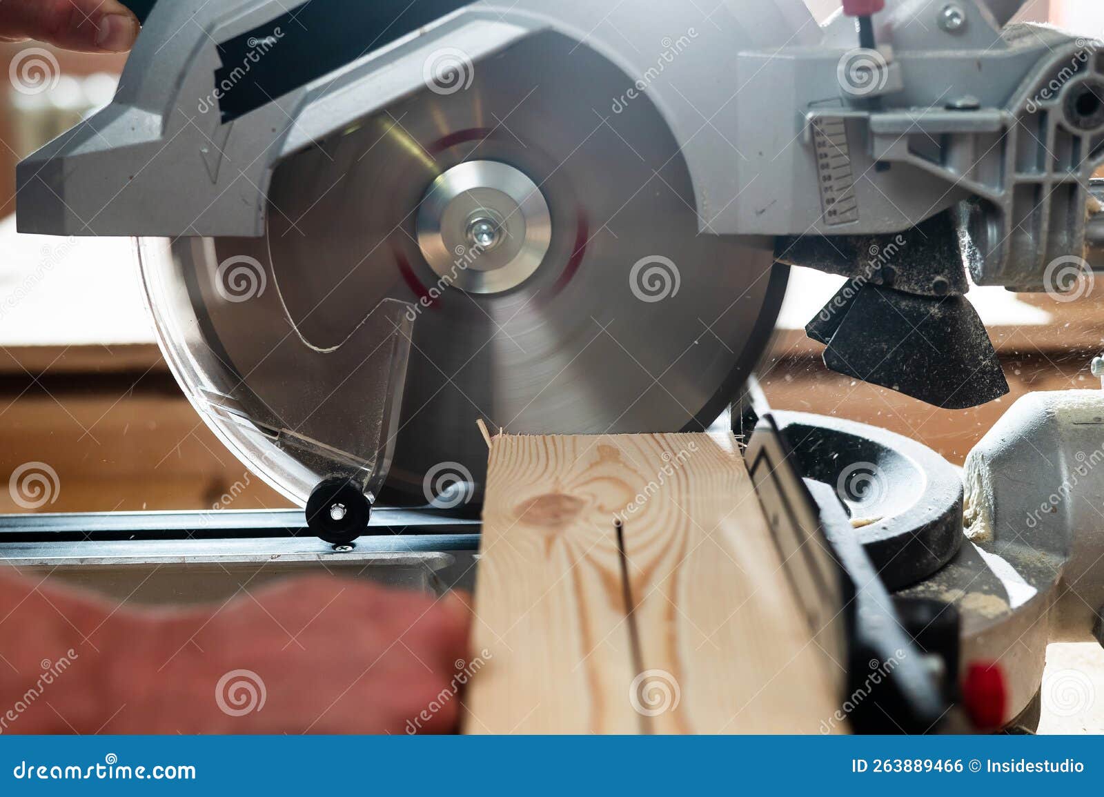Master Cuts the Board with a Circular Saw in the Workshop. Stock Photo ...
