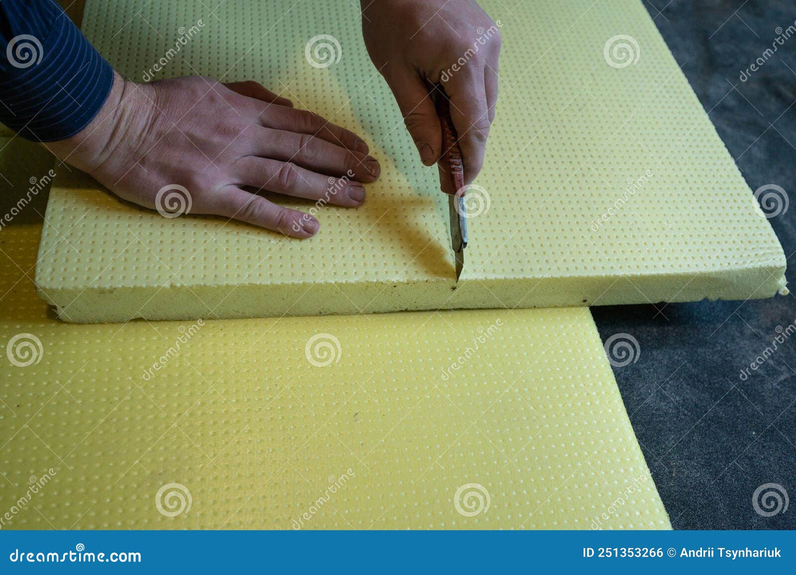 The Master Cuts Expanded Polystyrene on a Floor, Installation and ...