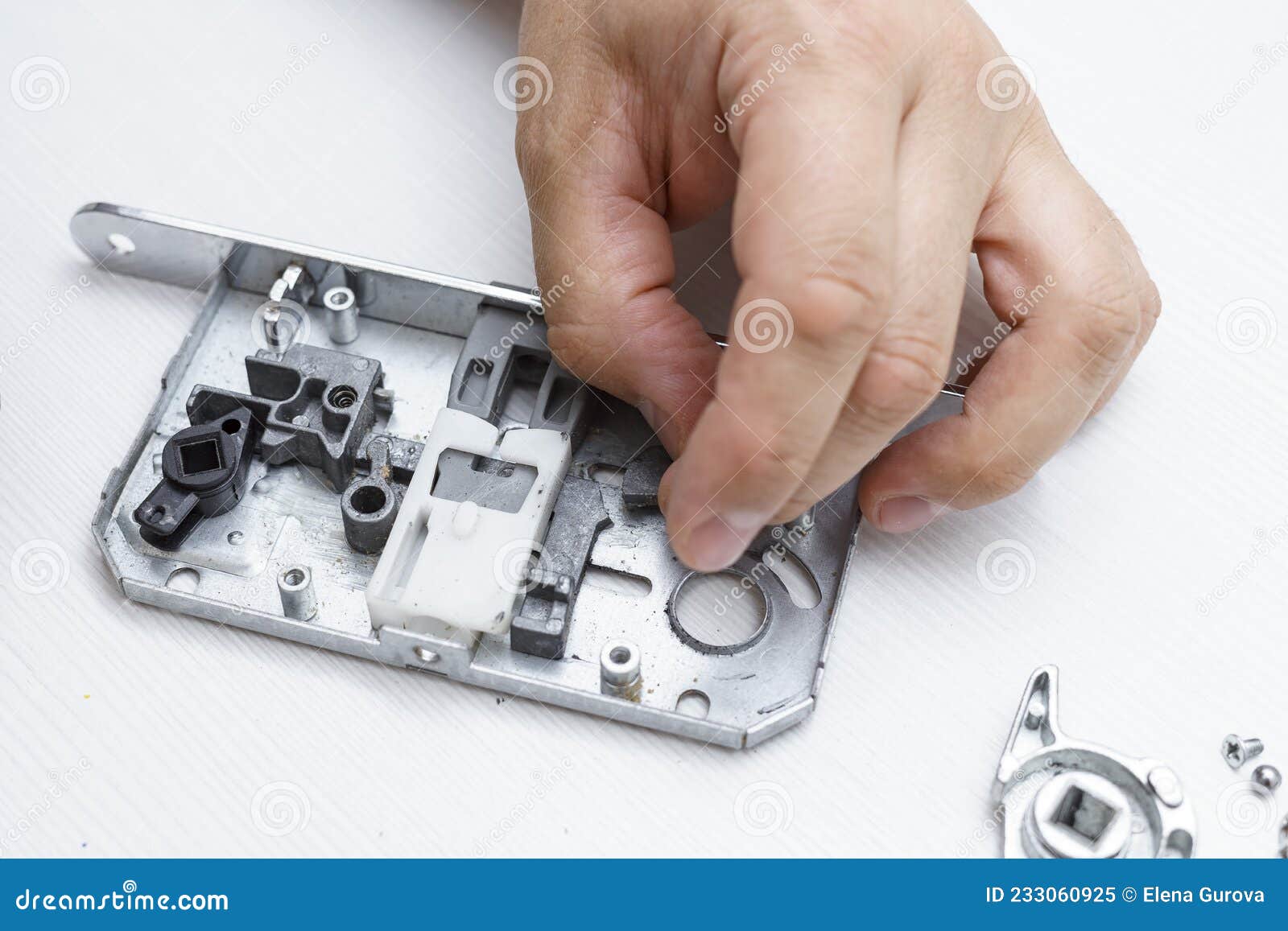 The Master Disassembles the Door Lock with a Screwdriver Stock Image ...