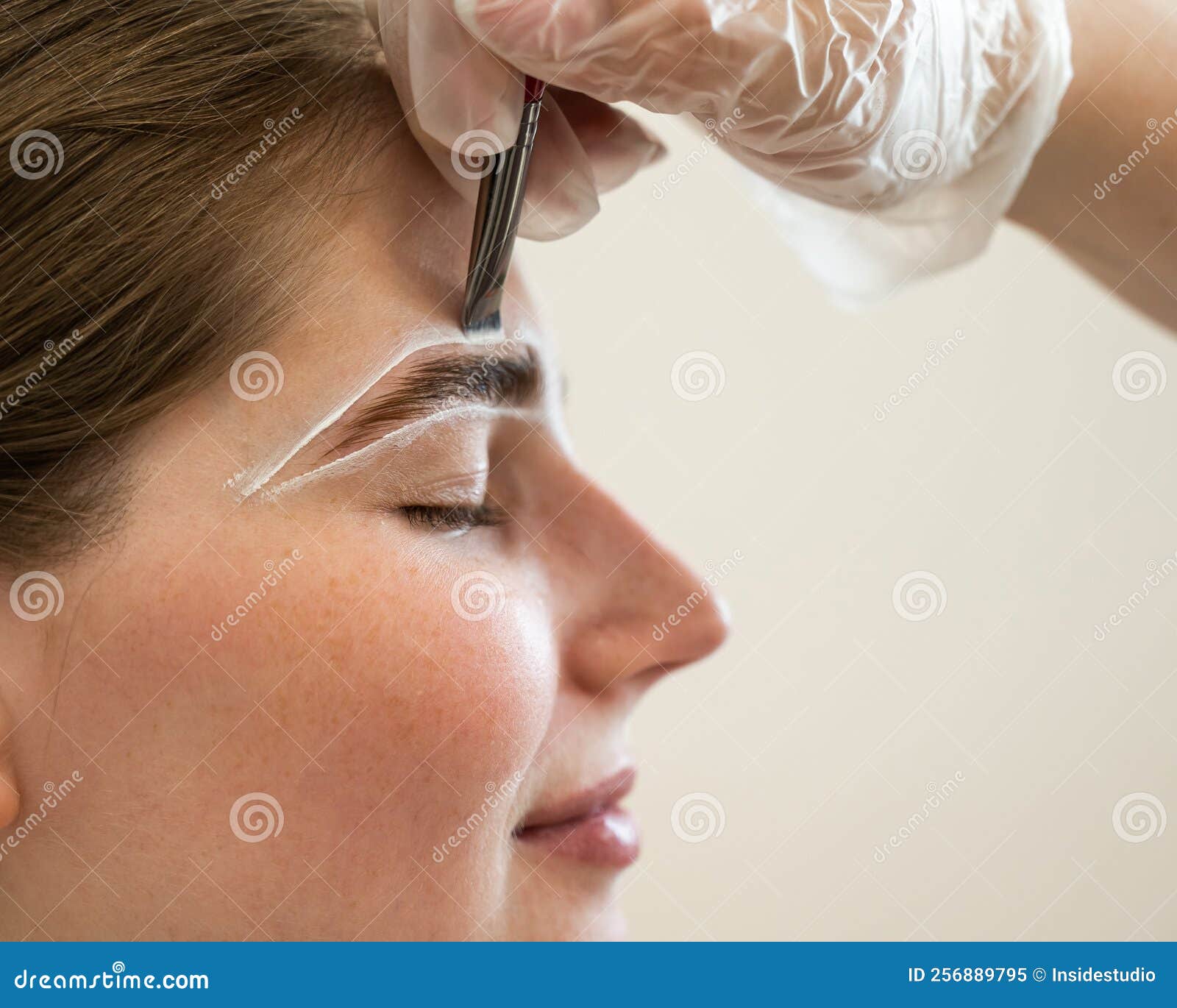 The Master Draws the Shape of the Eyebrows with White Paint before ...