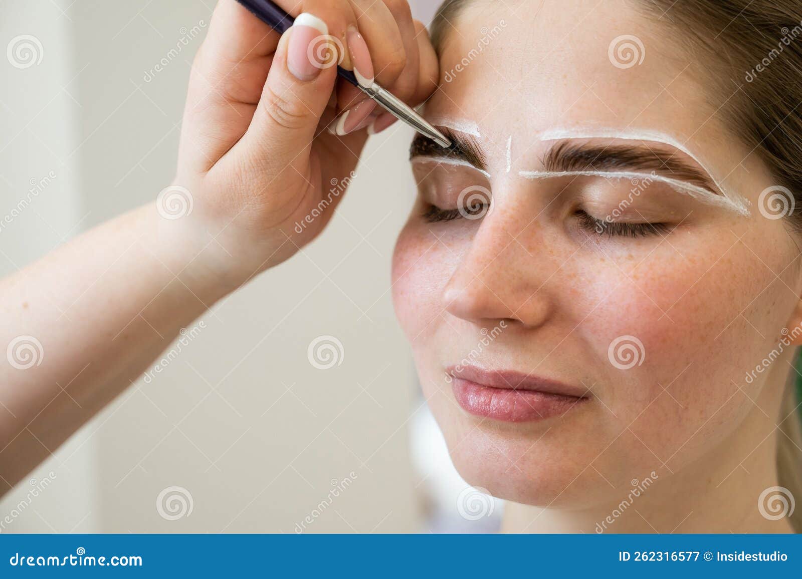 The Master Draws the Shape of the Eyebrows with White Paint before ...