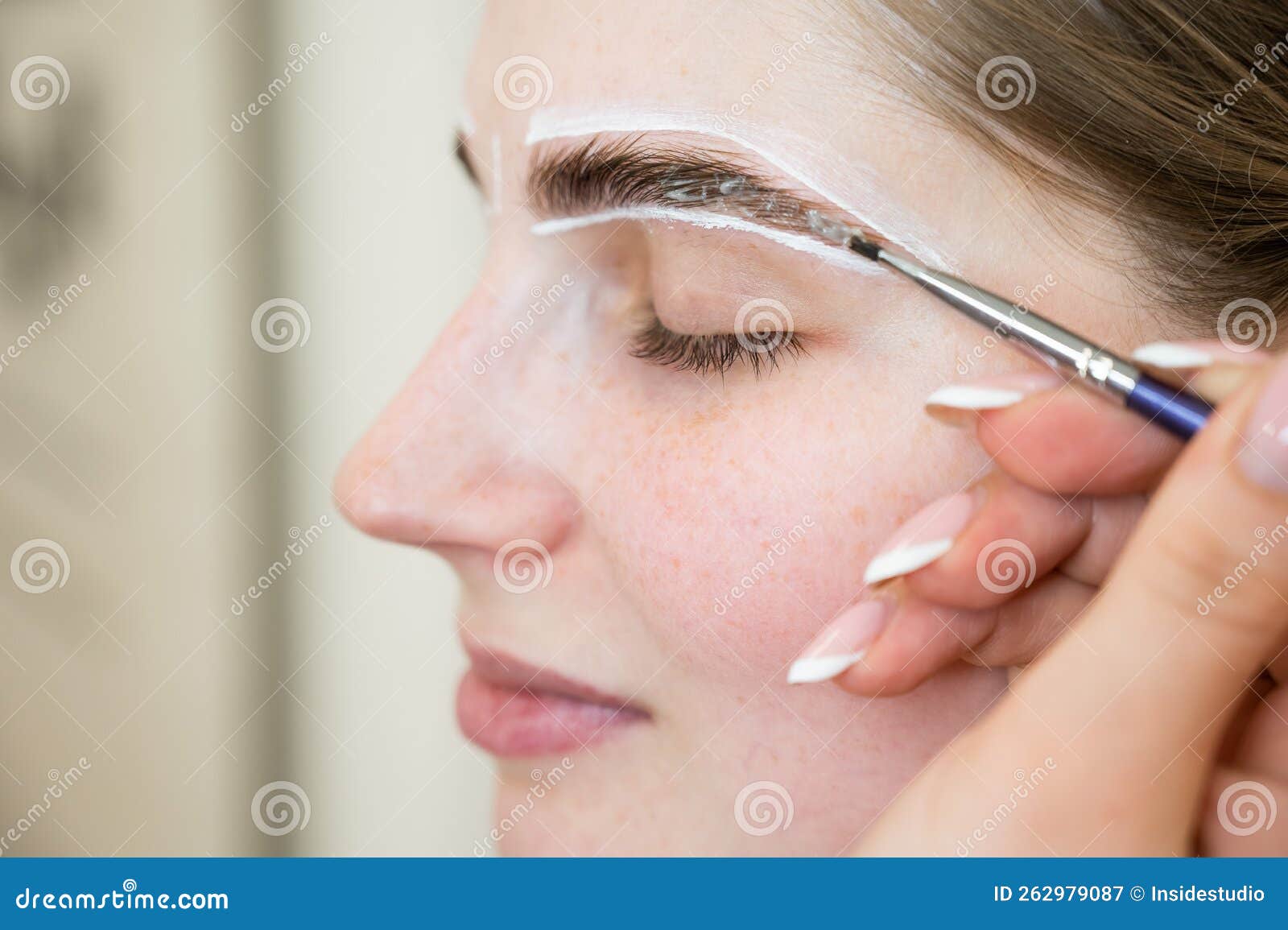The Master Draws the Shape of the Eyebrows with White Paint before ...