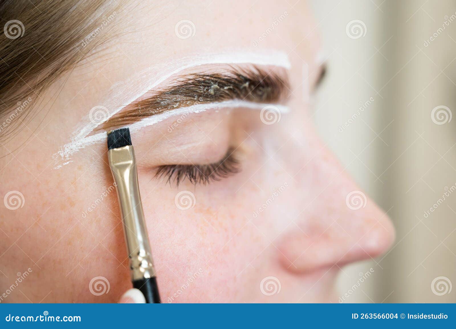 The Master Draws the Shape of the Eyebrows with White Paint before ...