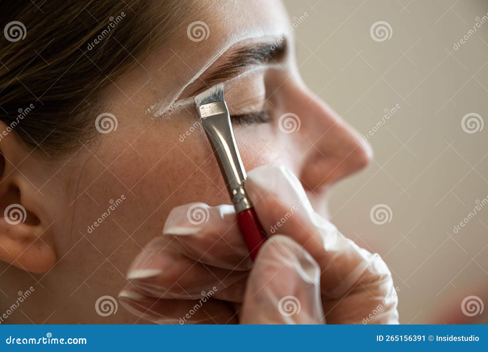 The Master Draws the Shape of the Eyebrows with White Paint before ...