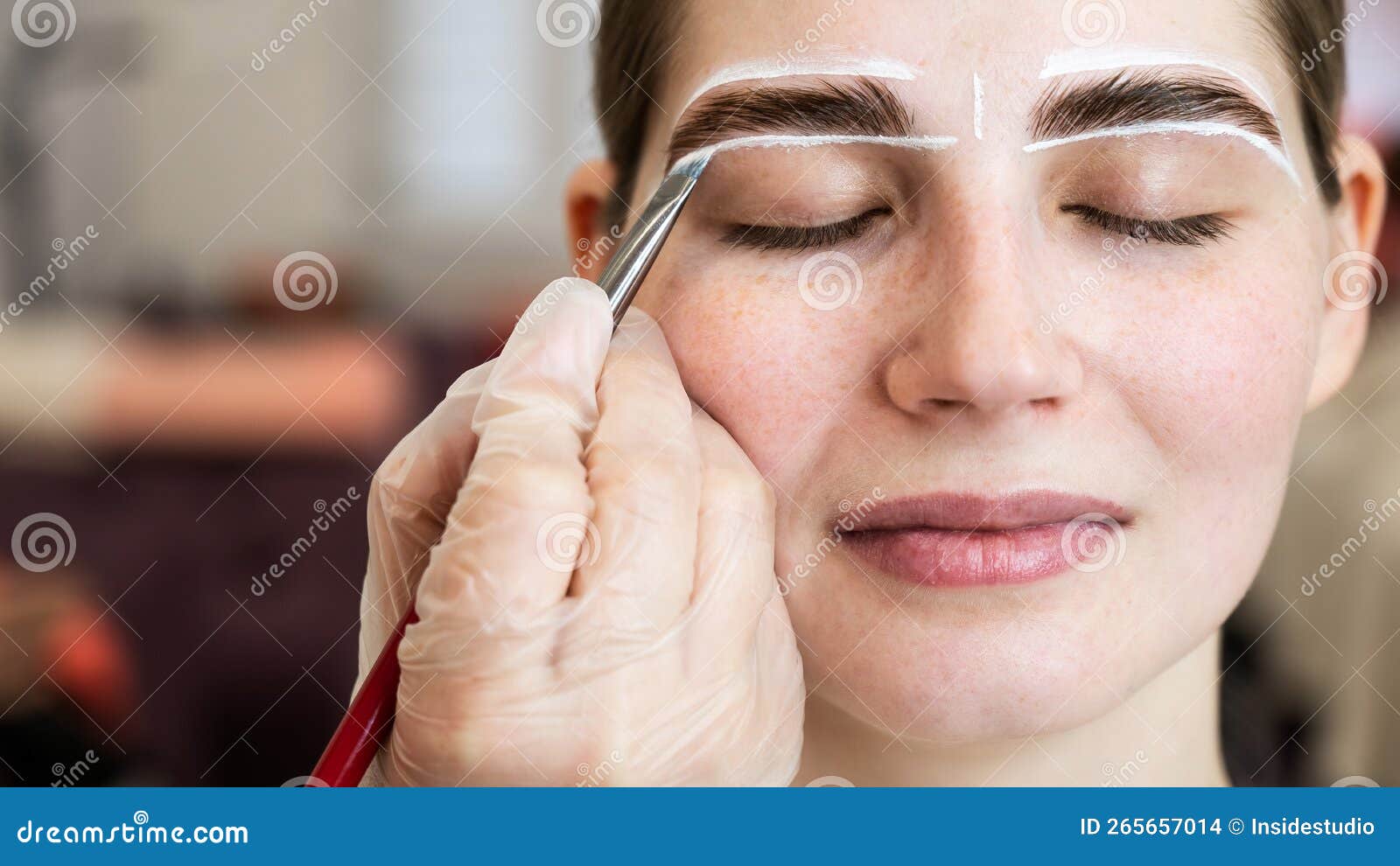 The Master Draws the Shape of the Eyebrows with White Paint before ...