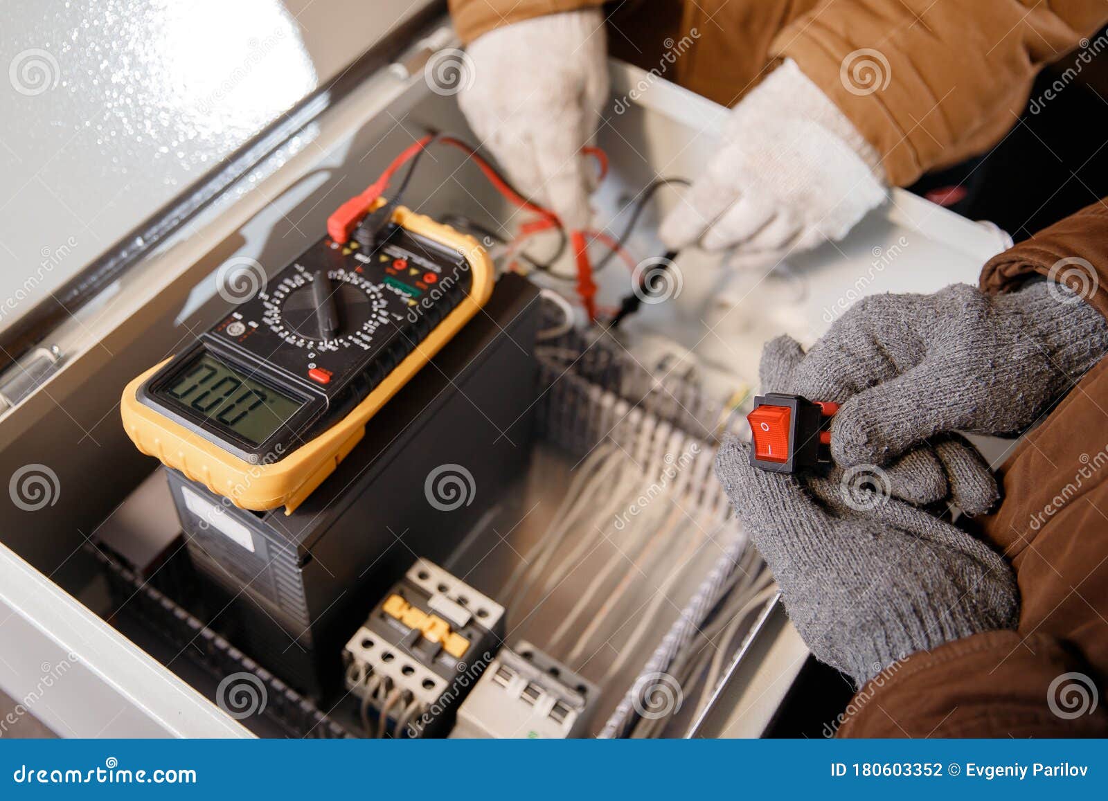 Master Electrician Checks Electrical Panel with Multimeter for Short ...