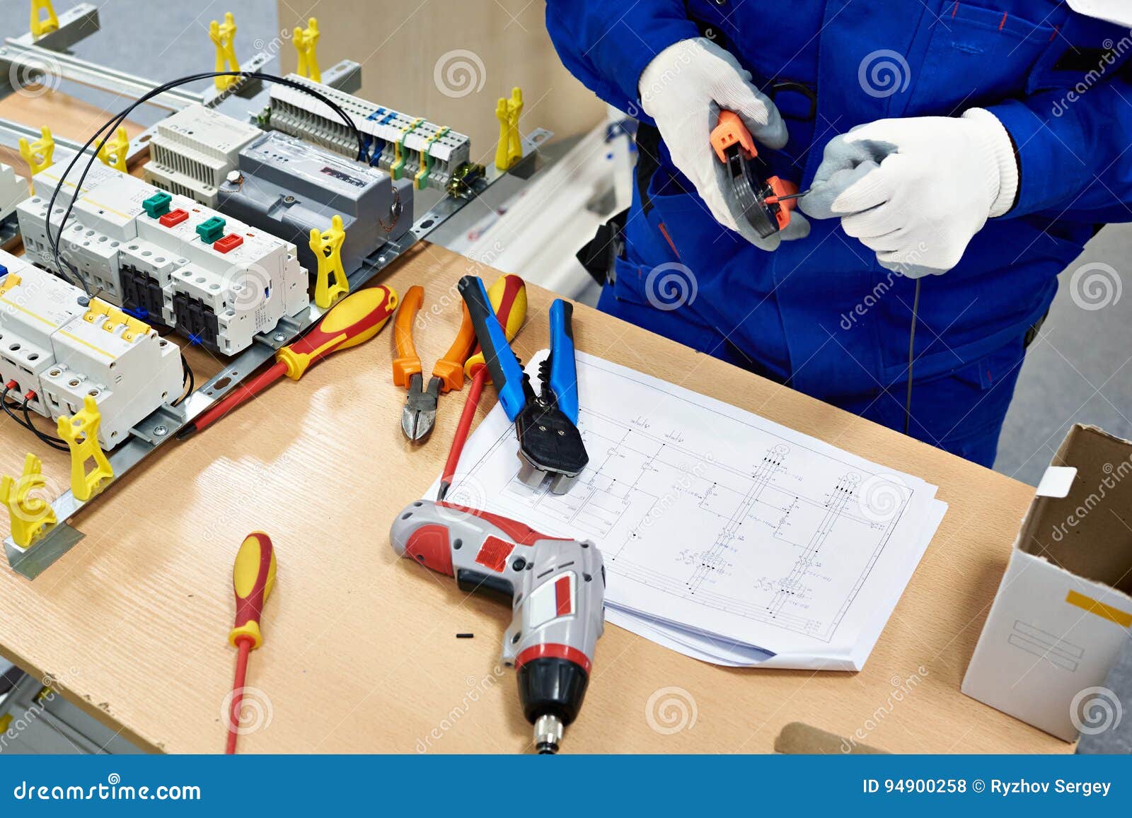 Master Electrician Collects Electrical Diagram Stock Photo - Image of ...