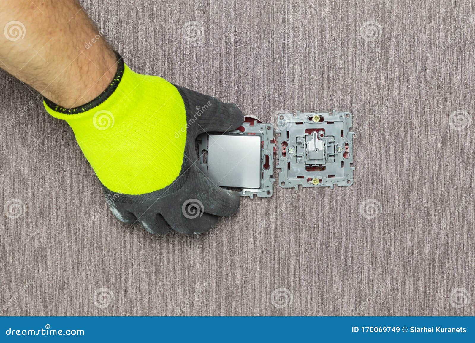 The Master Electrician Sets the Switch. Close-up. the Room is Colored ...