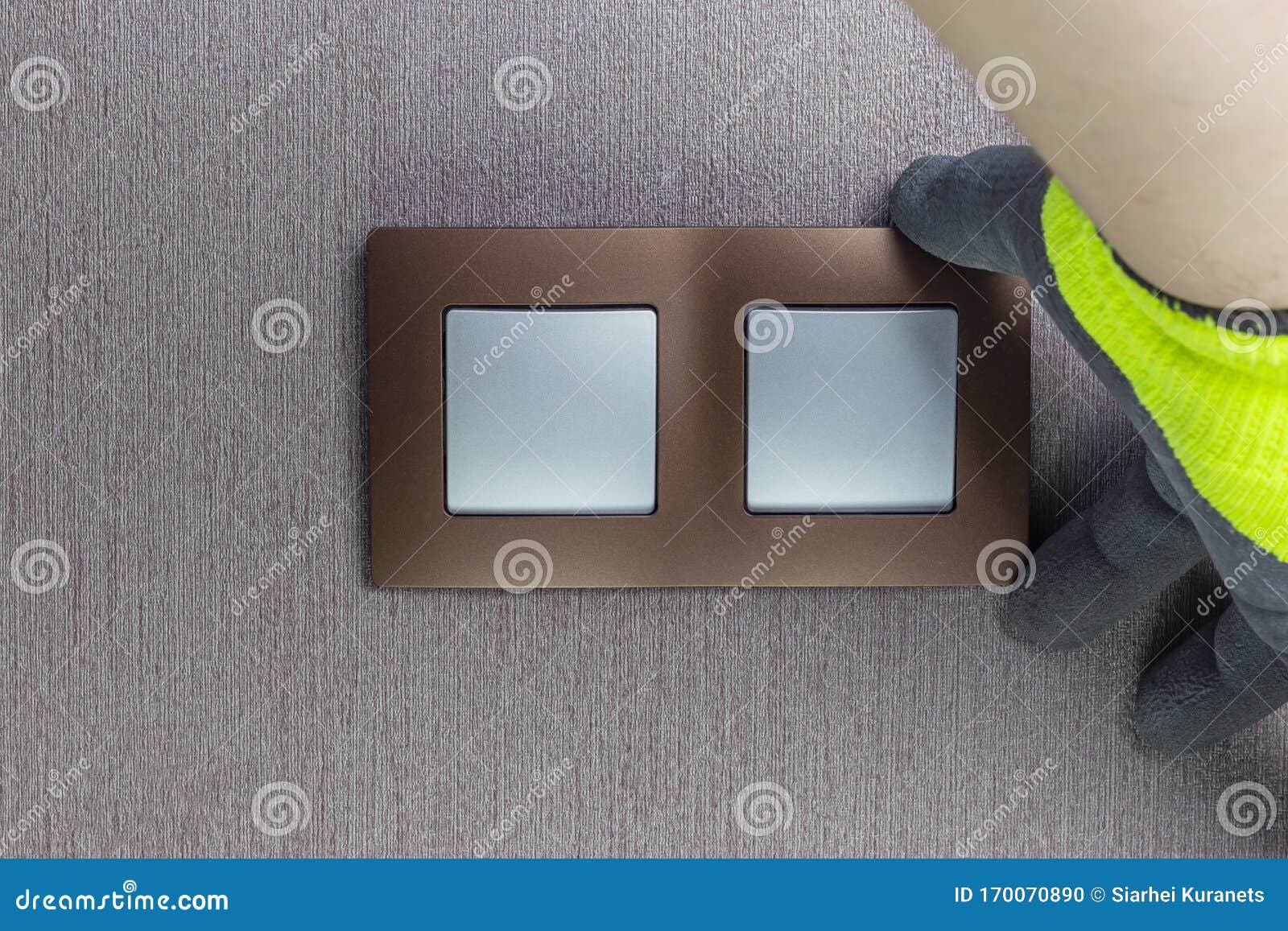 The Master Electrician Sets the Switch. Close-up. the Room is Colored ...