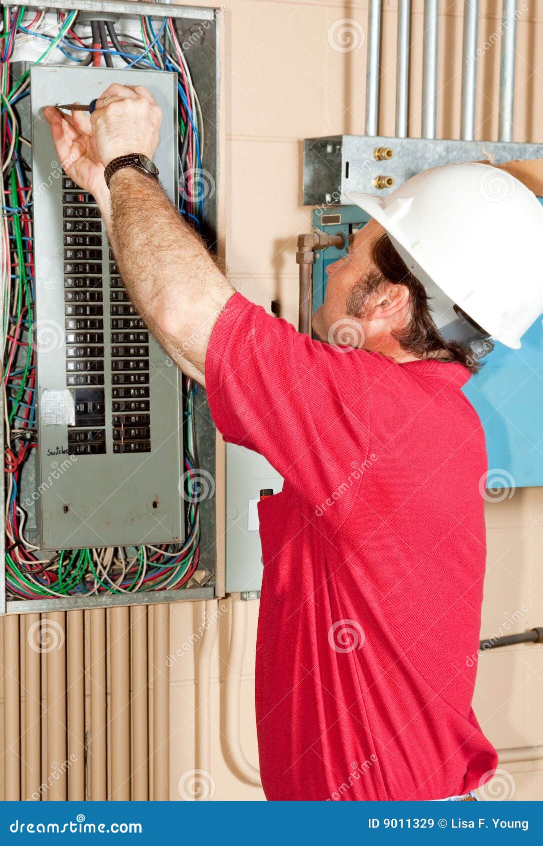 Master Electrician Working stock image. Image of industrial - 9011329