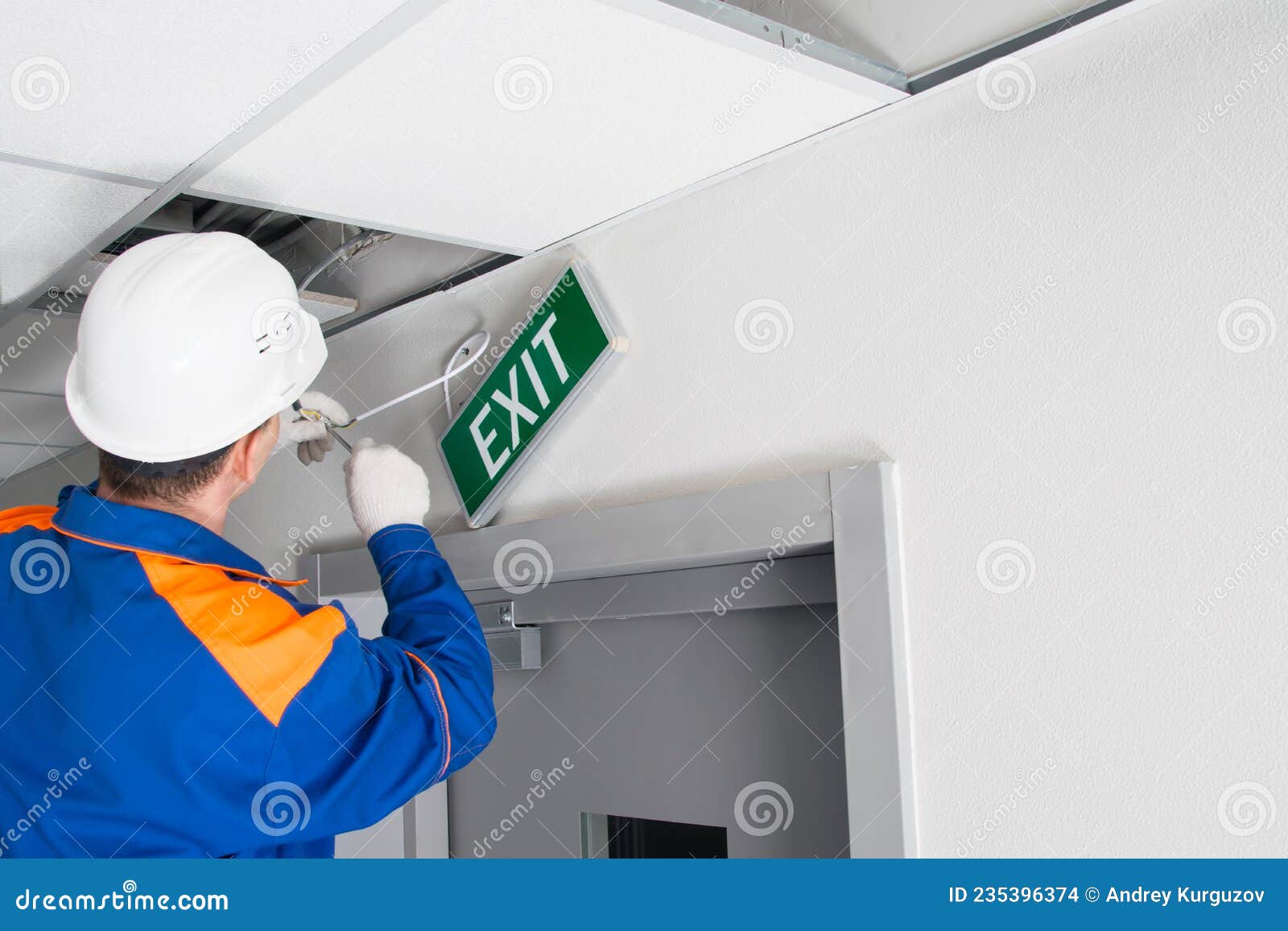 The Master Of Emergency Evacuation Exits Maintenance, Repairs The ...