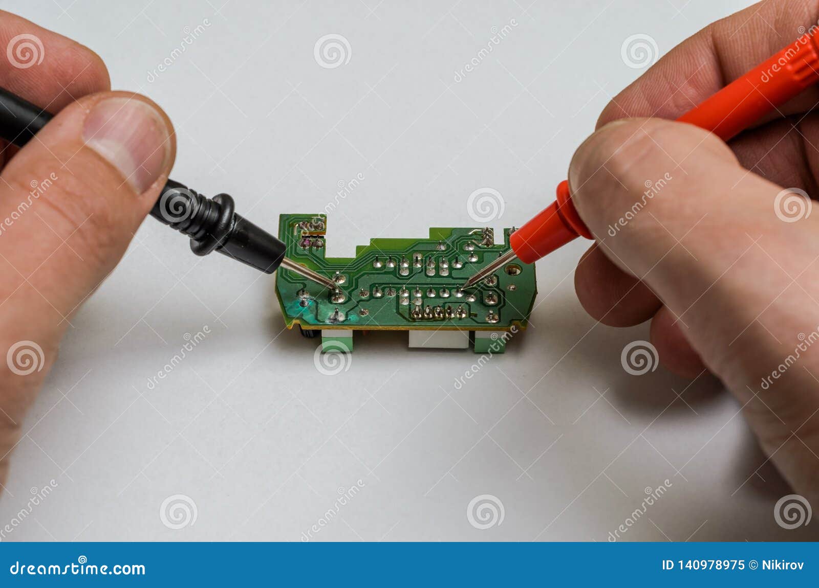 Master Engineer Tests and Repairs Microchip with Multimeter Stock Image ...
