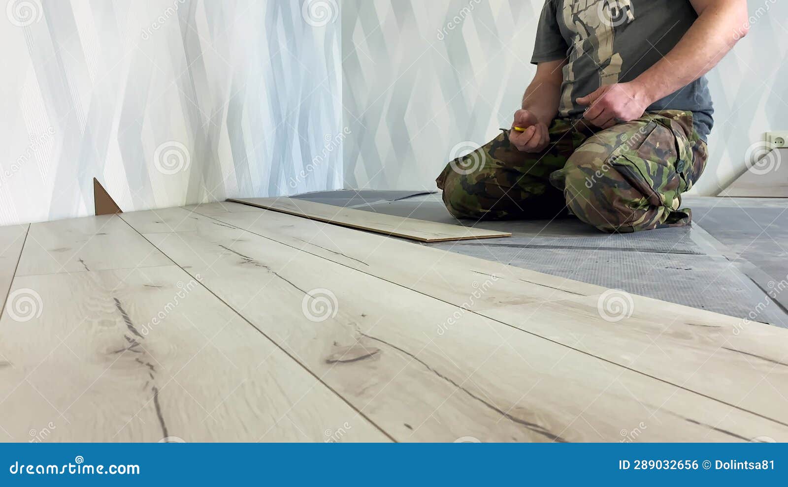 Master of Floor Installation and the Process of Laying Laminate on the Floor Stock Footage ...