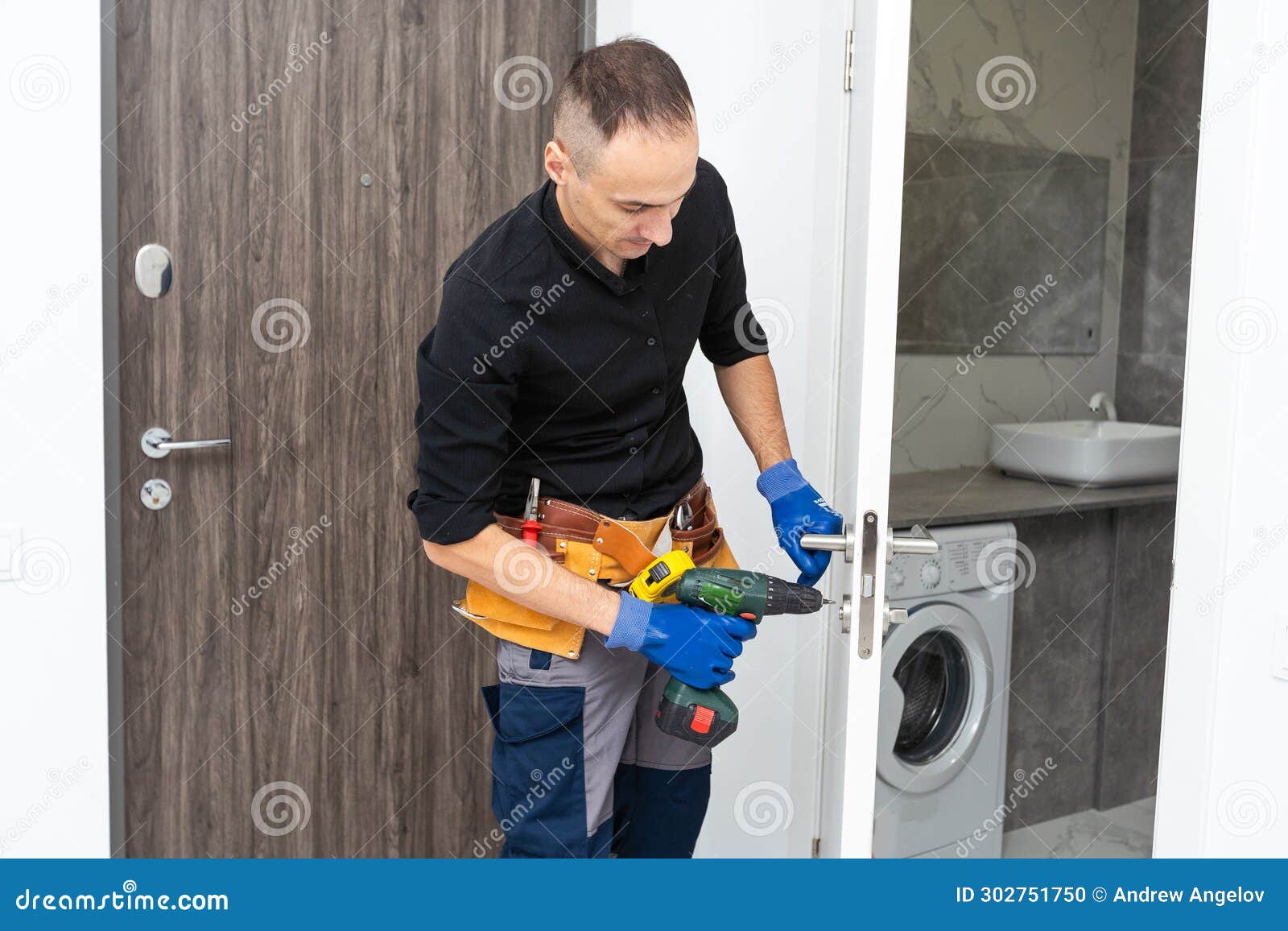 Master of Installation and Repair of Door Locks at Work Stock Photo ...