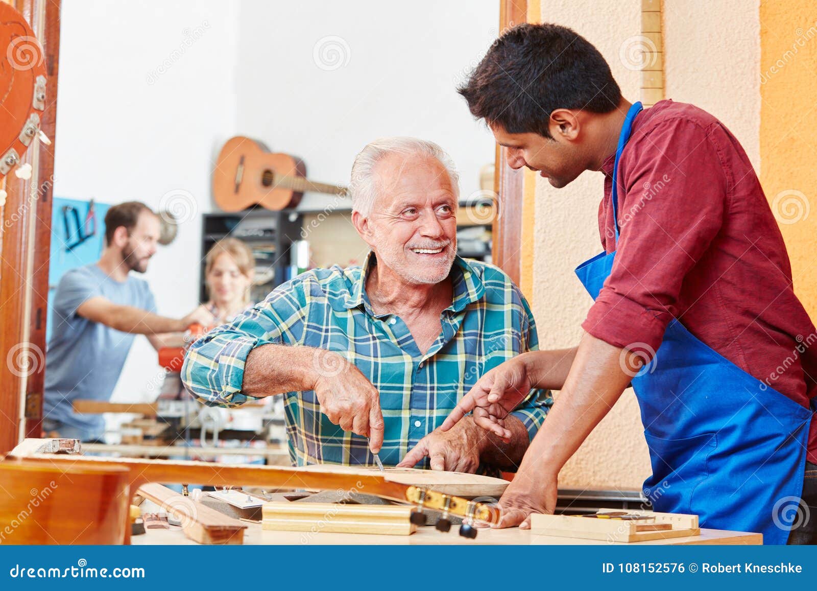 Master Luthier Helps Apprentice Stock Photo - Image of educate ...