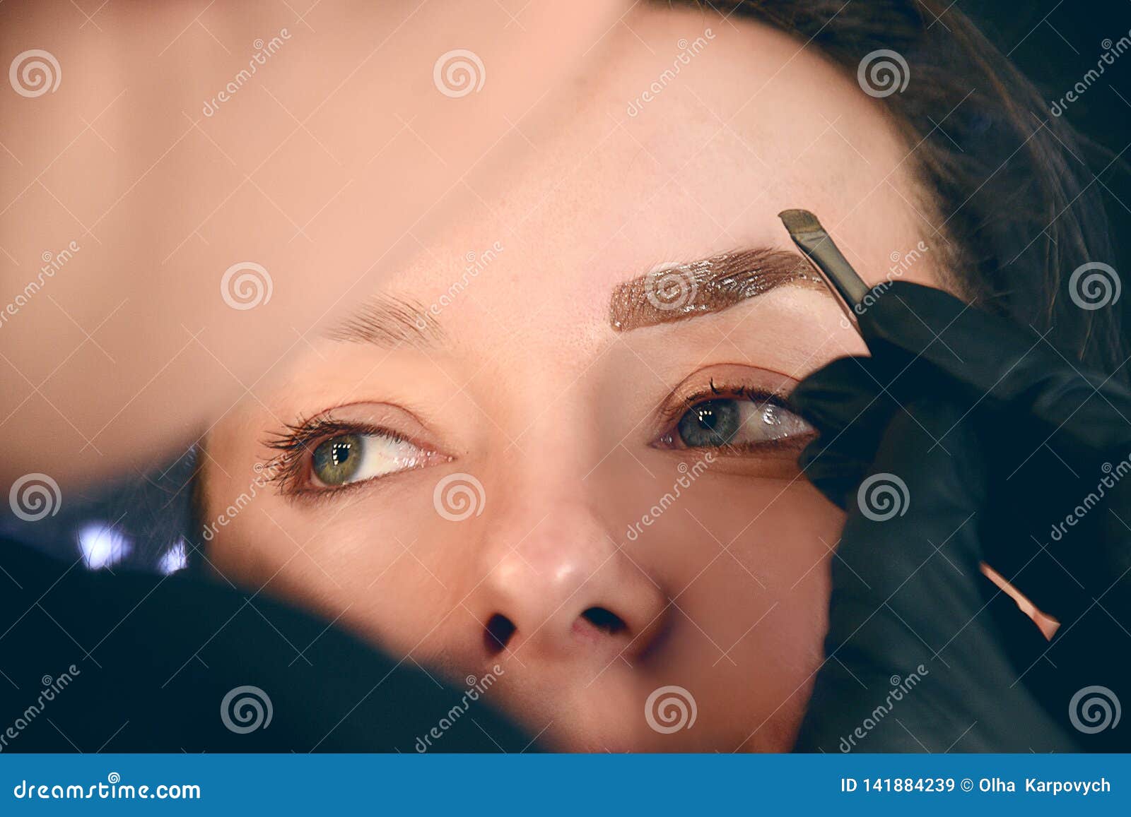Master Makes Eyebrows. Eyebrow Lamination. the Girl Makes Eyebrows in ...