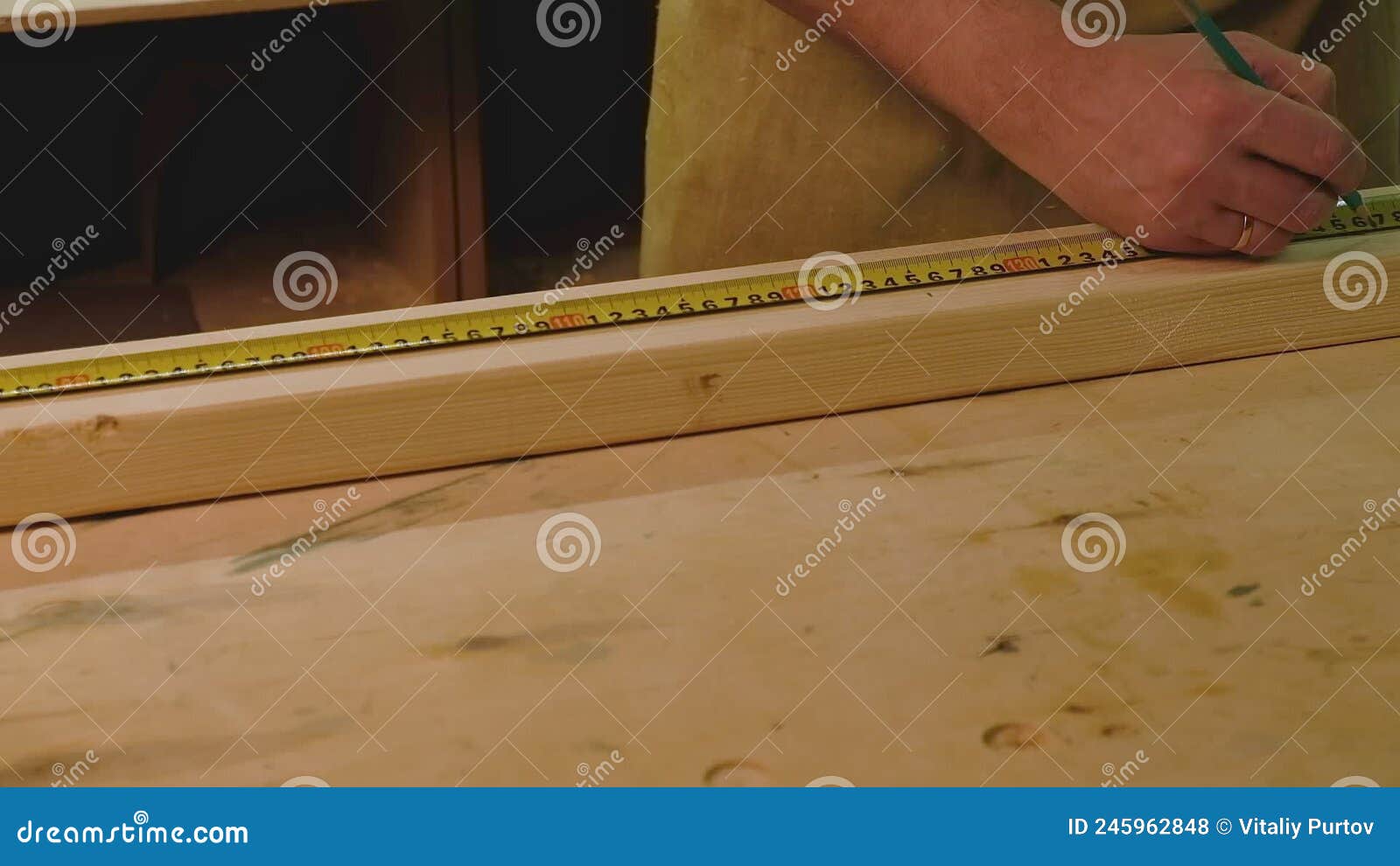 The Master Makes Measurements on the Board with a Ruler and Pencil ...