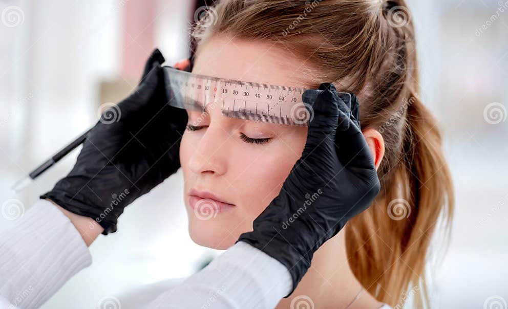 Master Making Eyebrows Permanent Makeup Stock Photo - Image of girl ...
