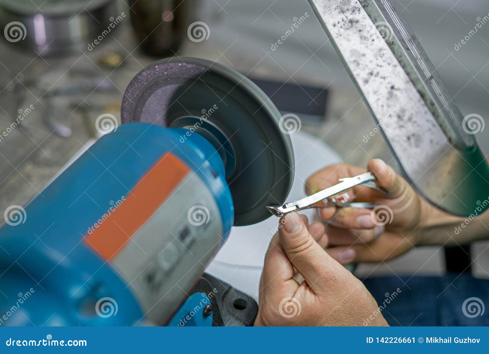 Master Man Sharpens the Machine Scissors so they Were Sharp Stock Image ...