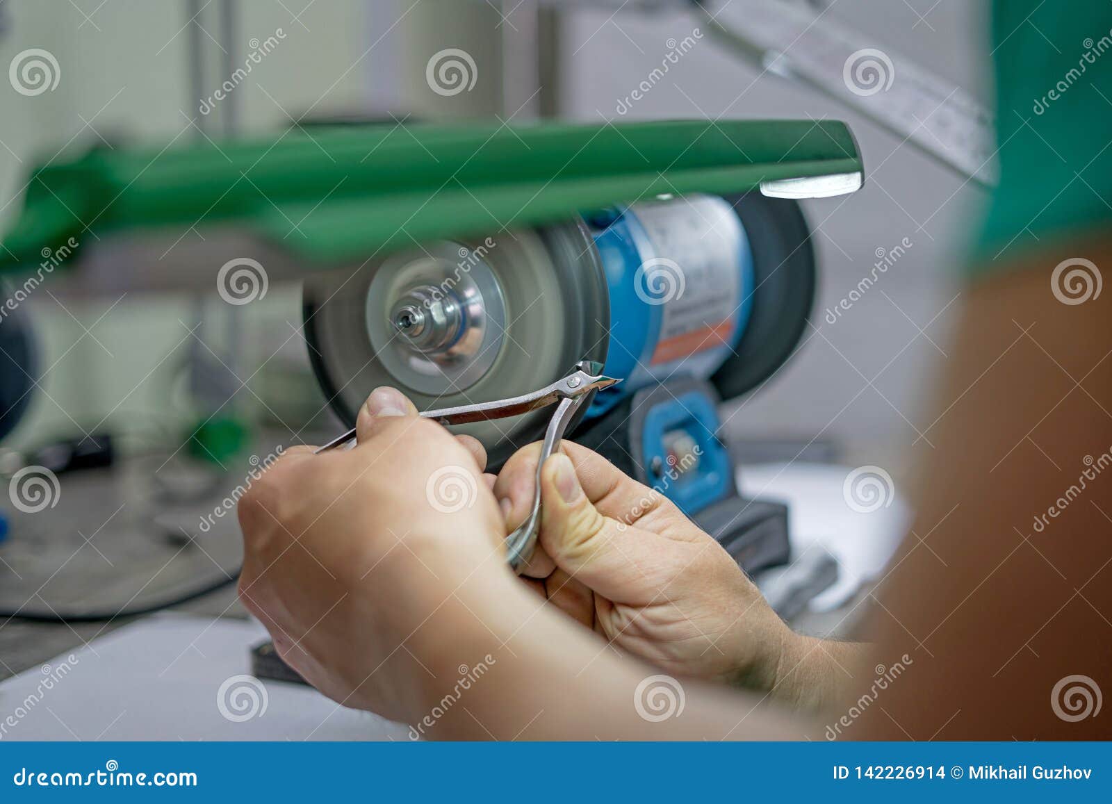 Master Man Sharpens the Machine Scissors so they Were Sharp Stock Photo ...