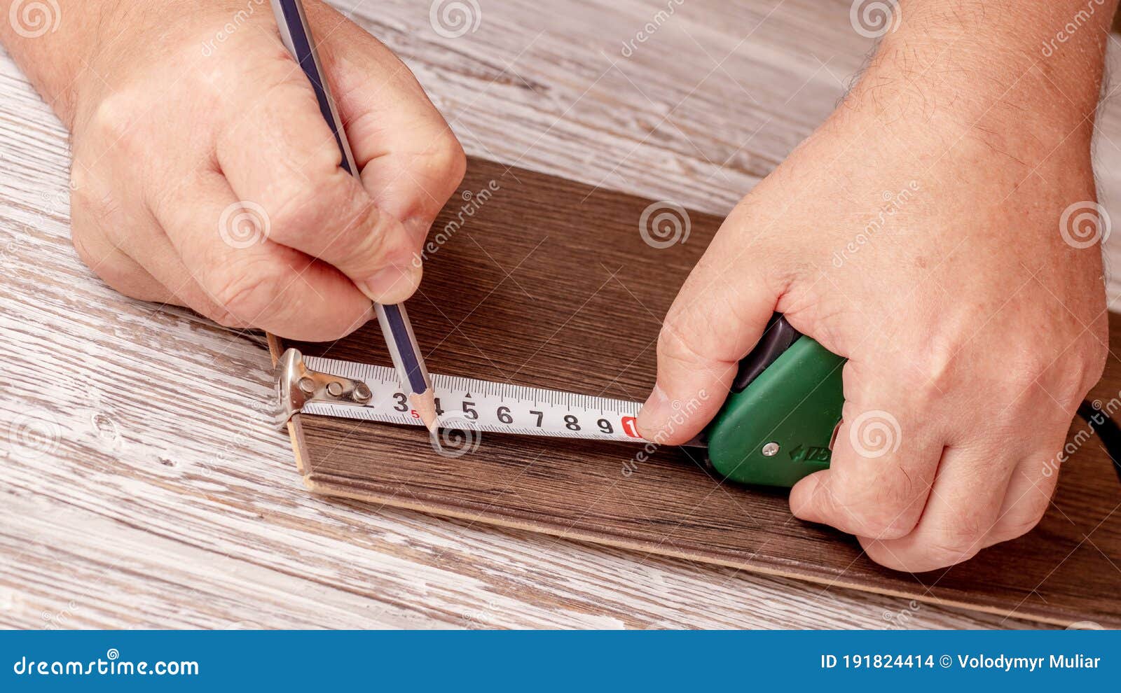 The Master Marks the Wood with a Tape Measure Stock Photo - Image of ...