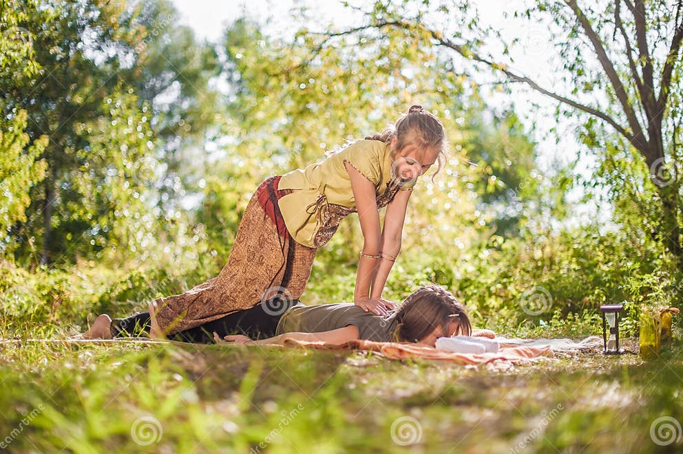 Master Massage Therapist Impliments Her Massage Abilities on the Forest ...