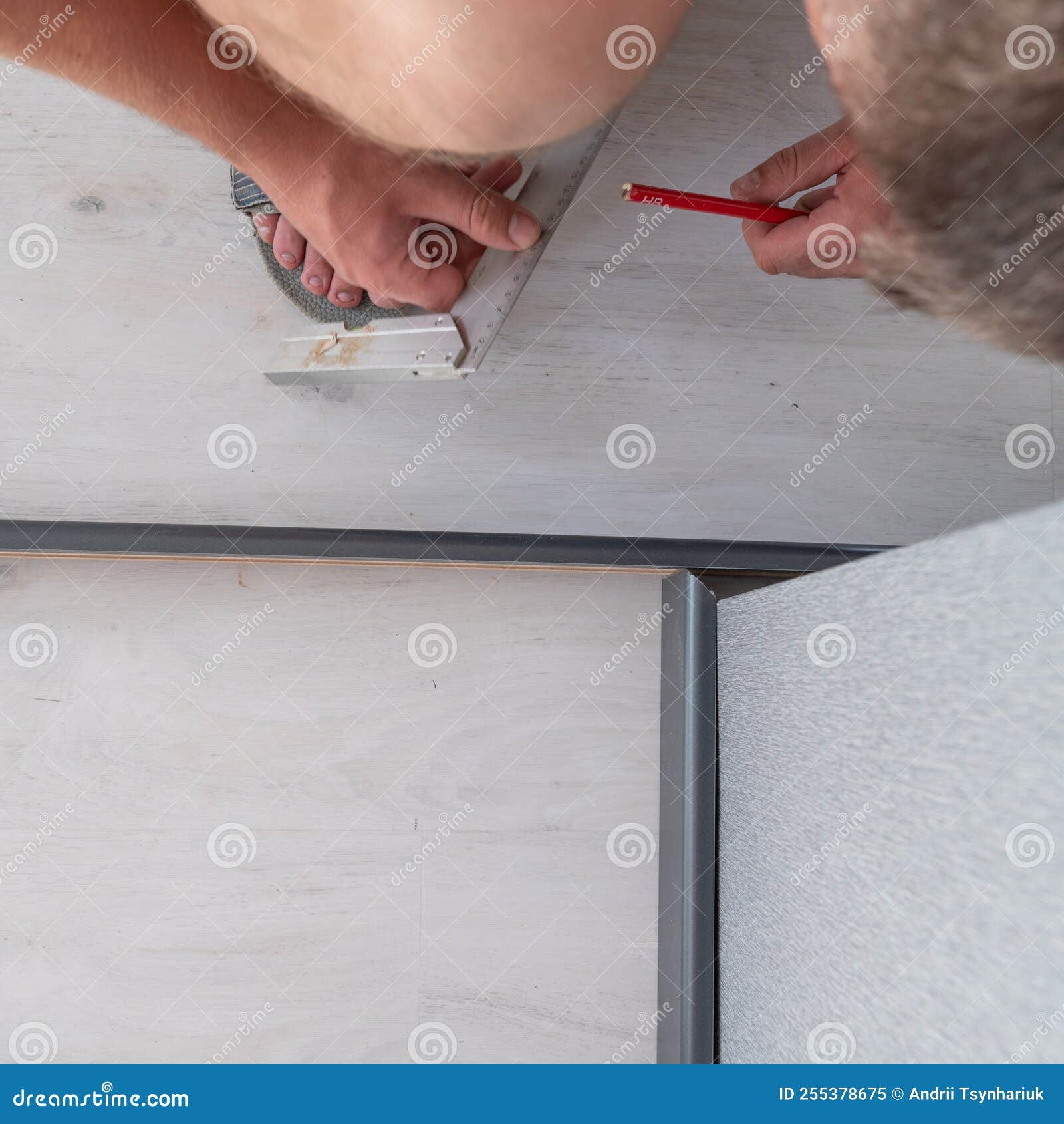 The Master Measures the Length of the Plinth for Cutting, Installing ...