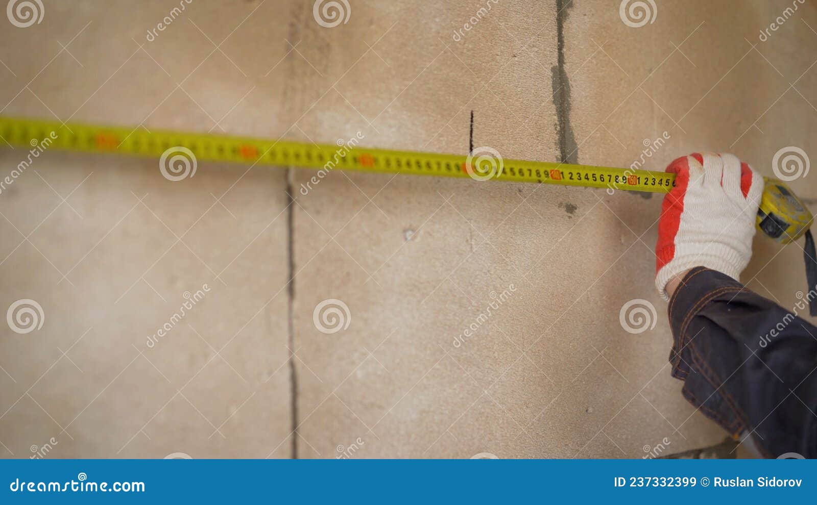The Master Measures the Distance on the Wall with a Tape Measure ...