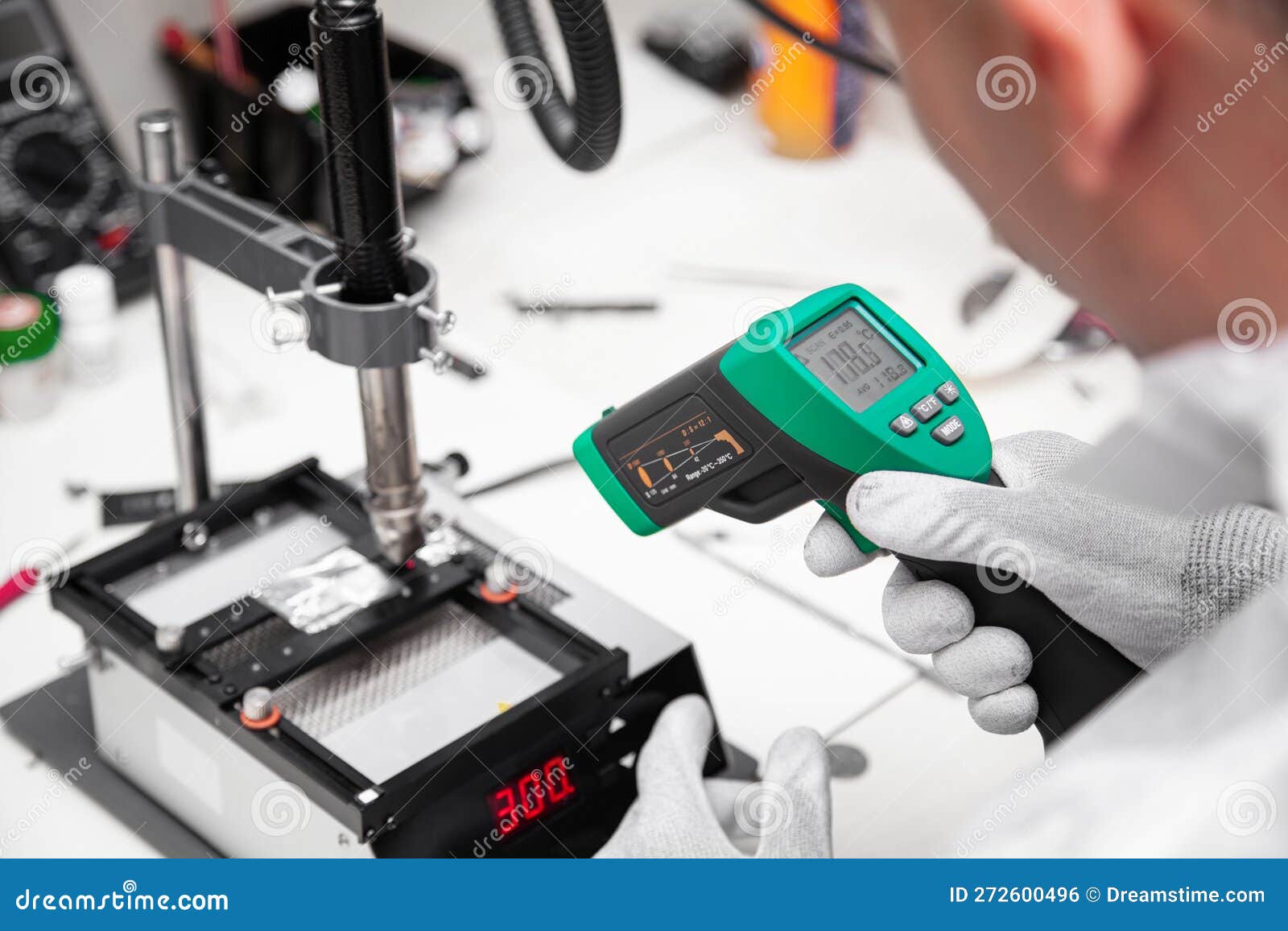The Master Measures the Temperature of the Microchip at the Soldering ...