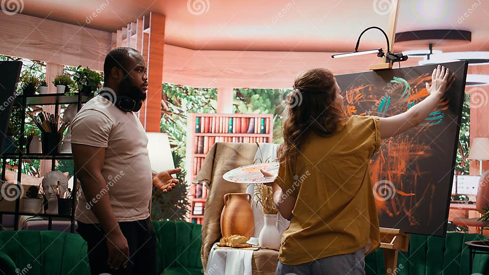 Master Painter and Apprentice Creating a Masterpiece with Finger Paint ...