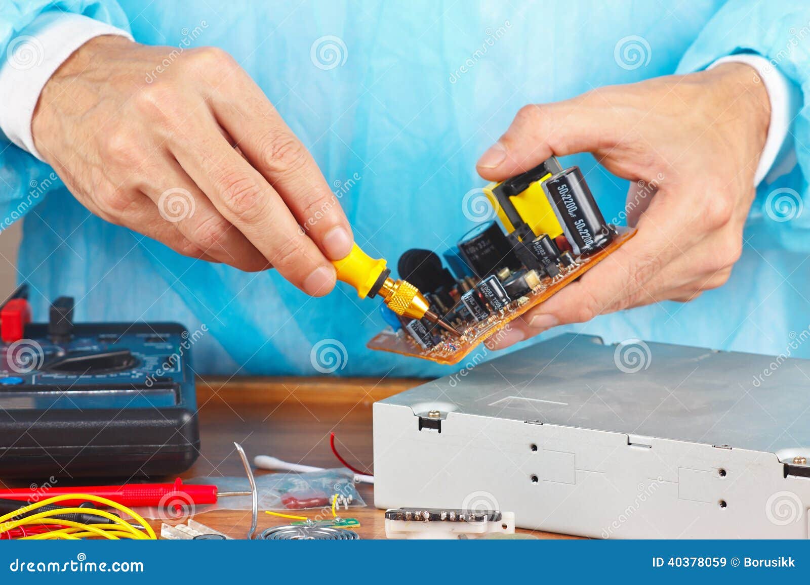Master Parses Electronic Hardware for Repair in Service Workshop Stock ...