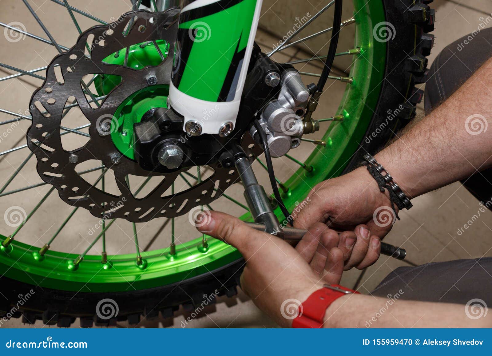 Master Performs Maintenance of the Motorcycle Brake System Stock Photo ...