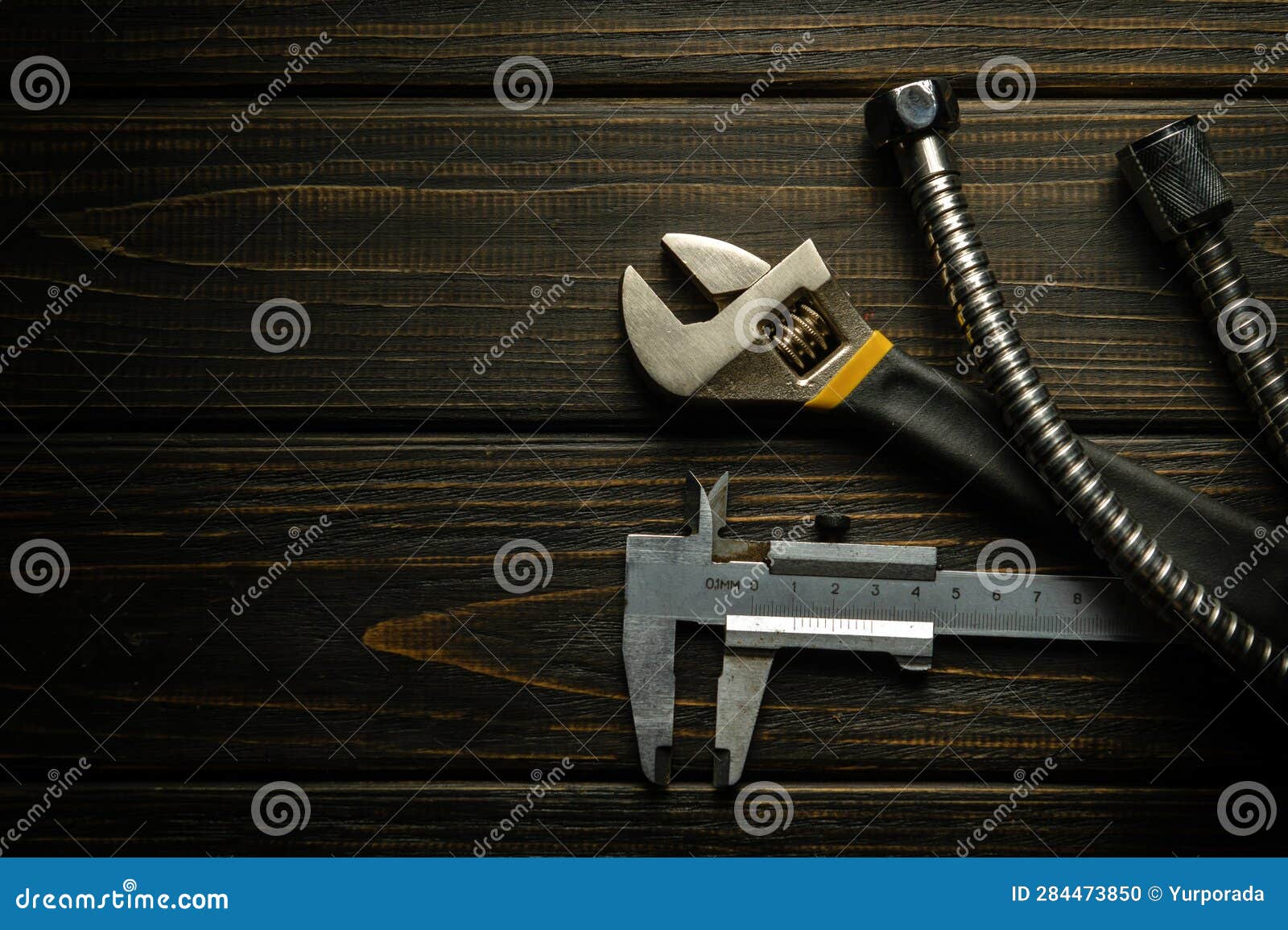 Master Plumber Tools and Hose on Black Vintage Table. Free Space for ...