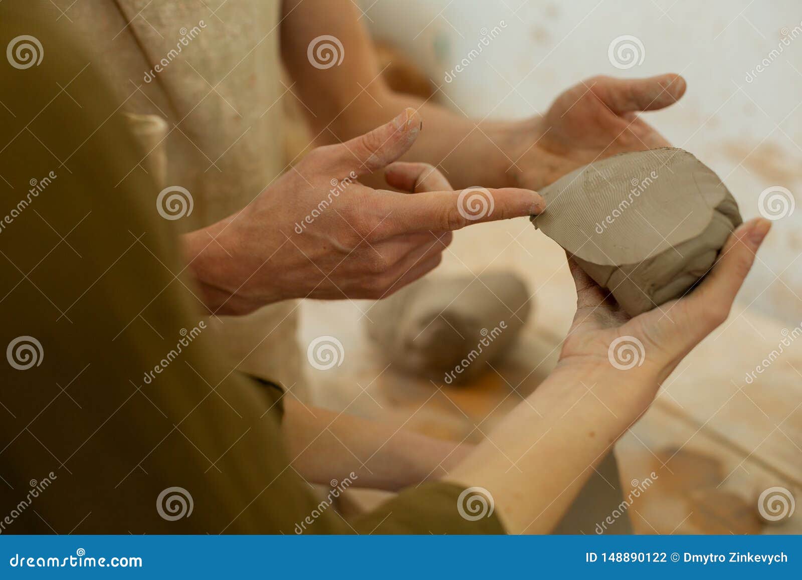 Master Pointing on Cut Piece of Fresh Clay and Talking Stock Photo ...